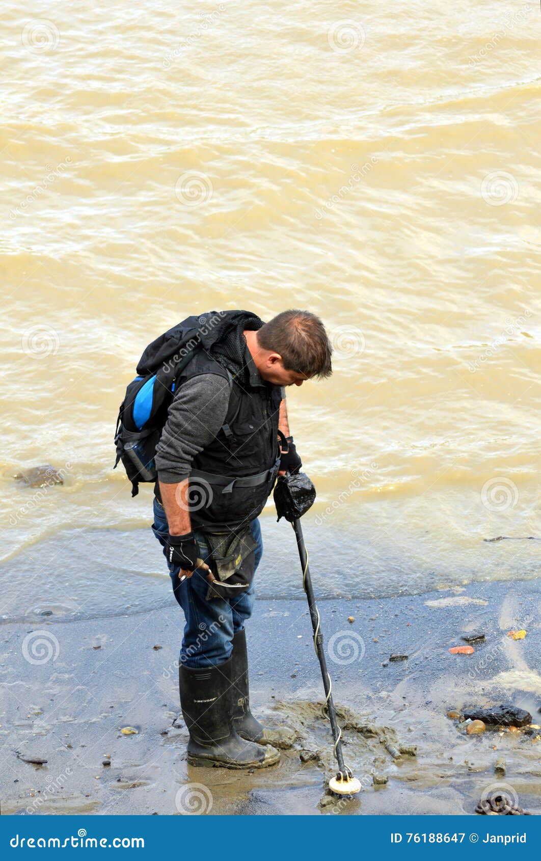 Mudlark editorial photography. Image of searching, alone - 76188647