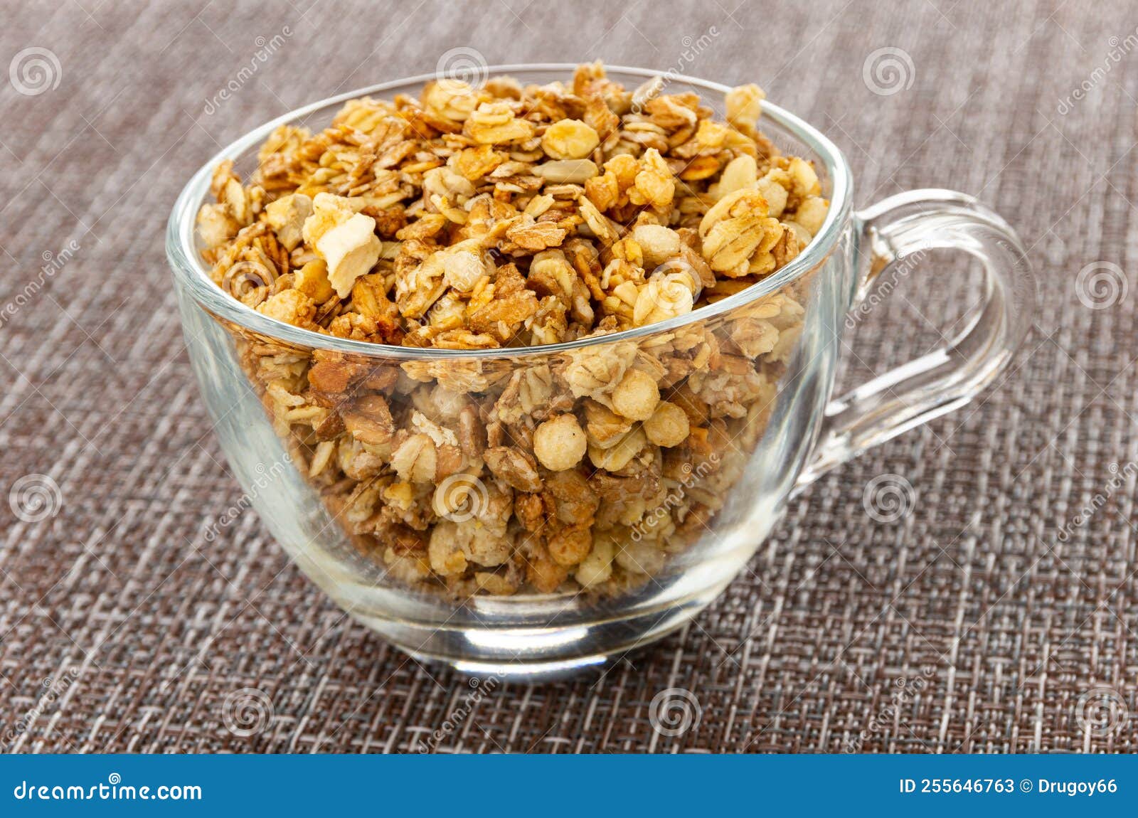 Muesli in Transparent Cup on Mat Stock Image - Image of dark ...