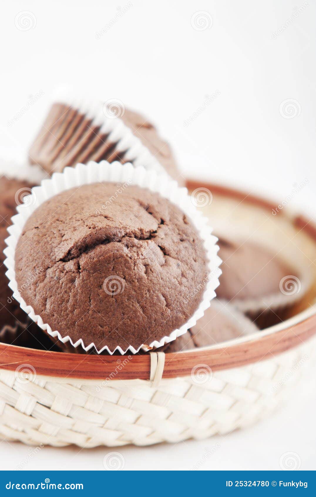 Muffin in basket stock photo. Image of isolated, breakfast - 25324780