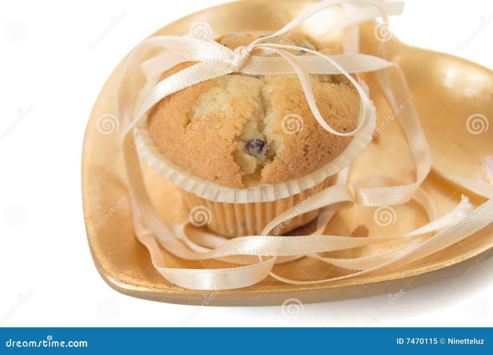 Muffin on a gold plate stock image. Image of sweet, gold - 7470115