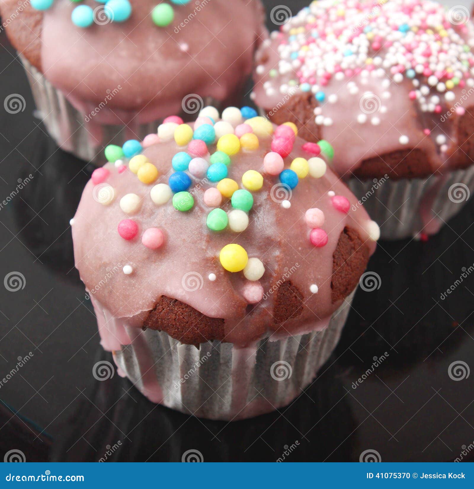 Muffins with Chocolate and Candies Stock Photo - Image of muffin, cakes ...