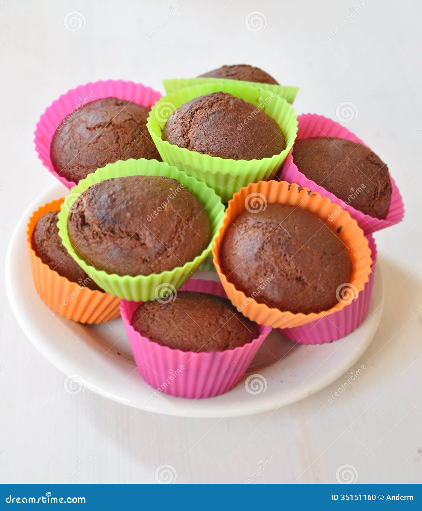 Muffins in Colourful Plastic Cups Stock Photo - Image of cupcake ...