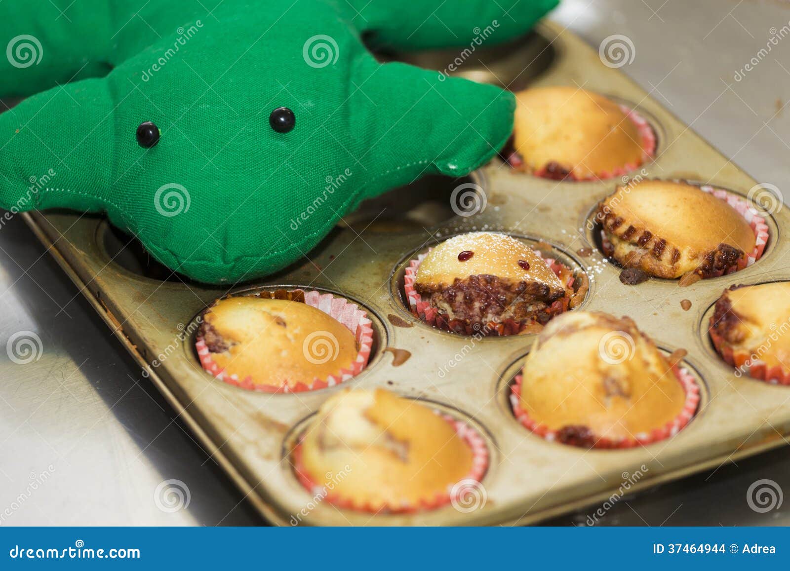 Frog Face Muffin and a Textile Cooking Oven Glove Stock Photo - Image ...