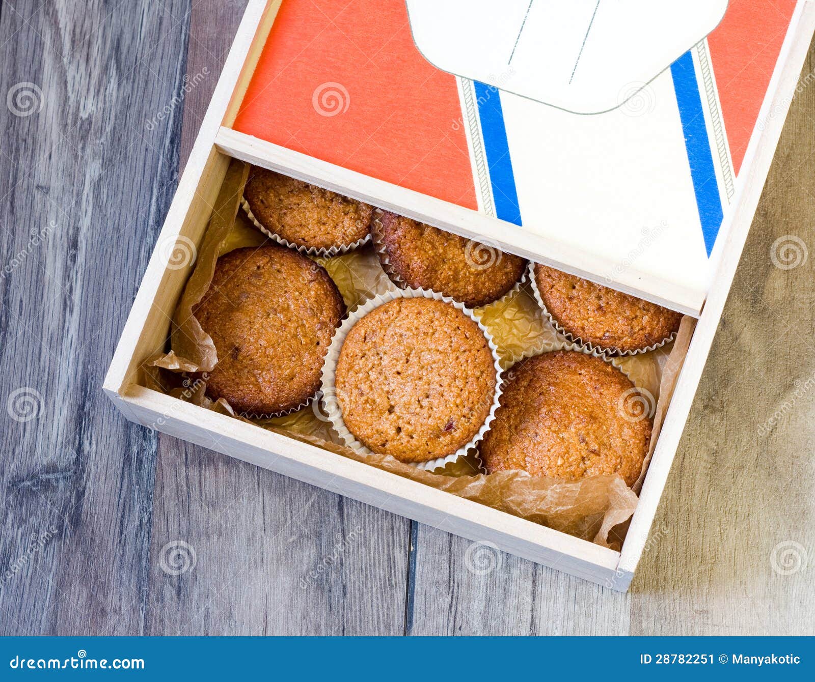 Muffins in a wood box stock image. Image of cakes, meal - 28782251