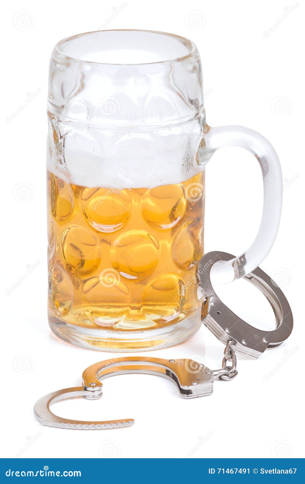 Mug of beer with handcuffs stock image. Image of munich - 71467491