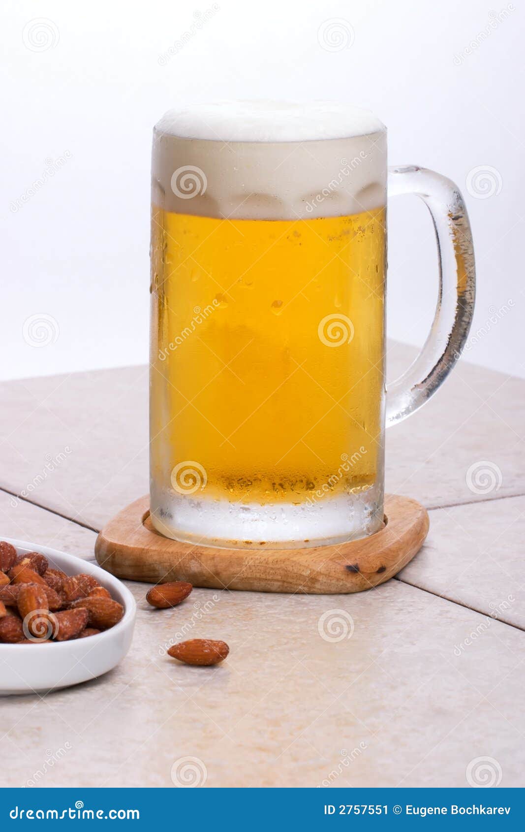 Mug of beer and nuts stock image. Image of refreshment - 2757551