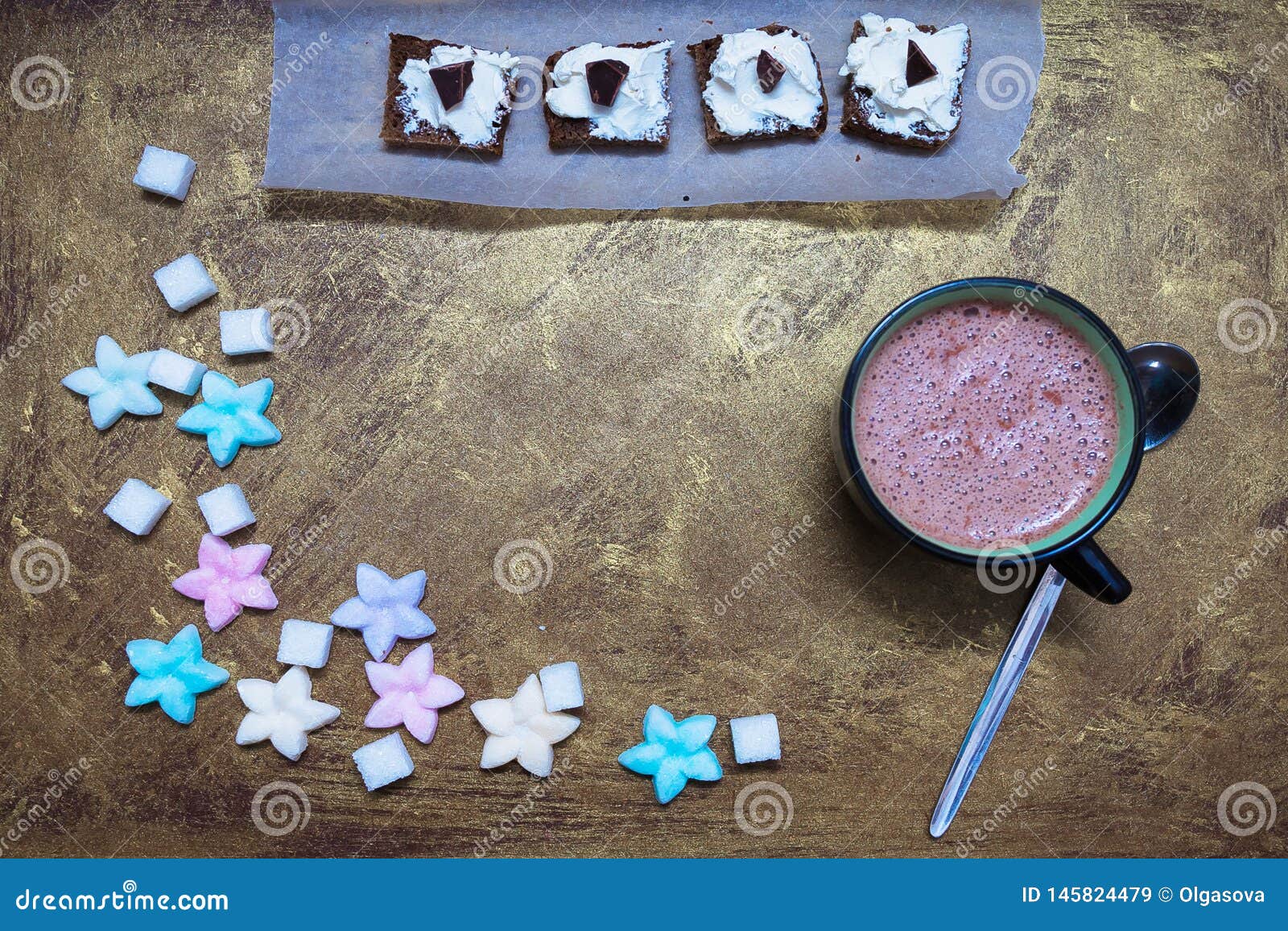 Mug of cocoa and sweets stock image. Image of gold, sweets - 145824479