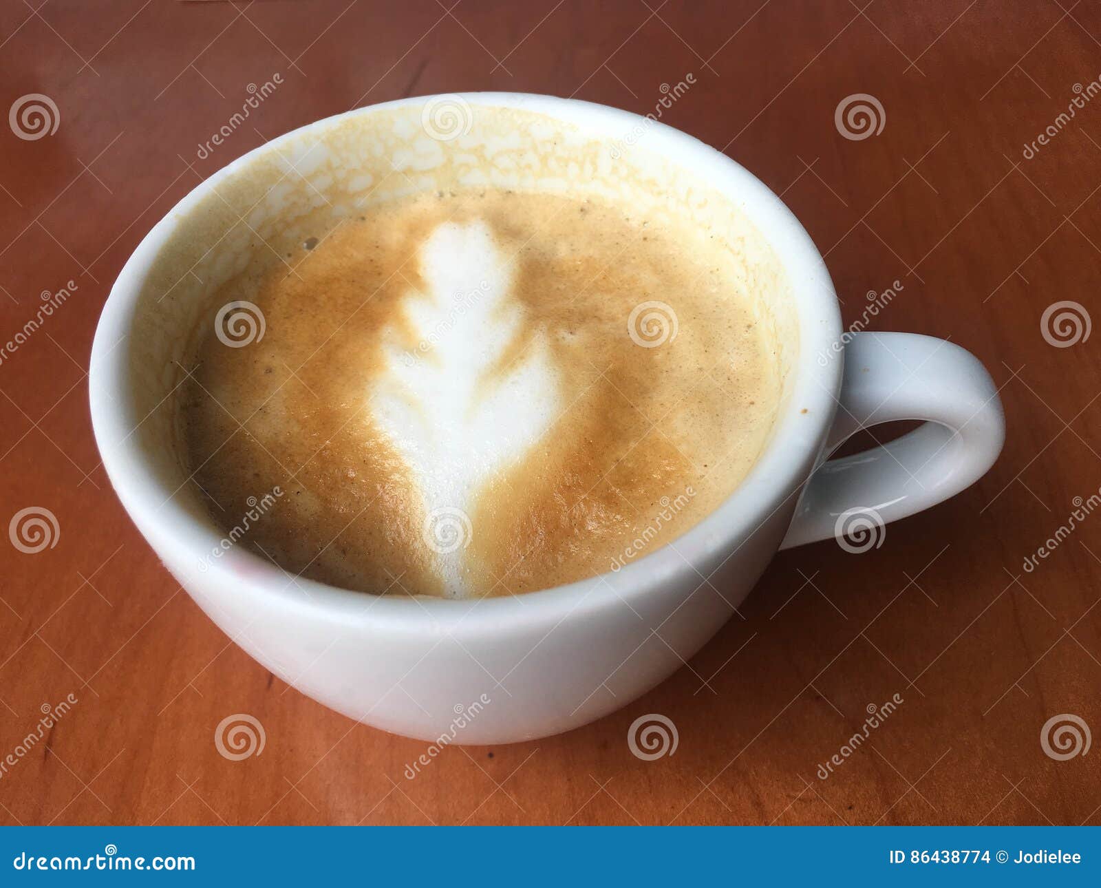 Mug of Coffee with Fancy Design on Top Stock Photo - Image of leaf ...