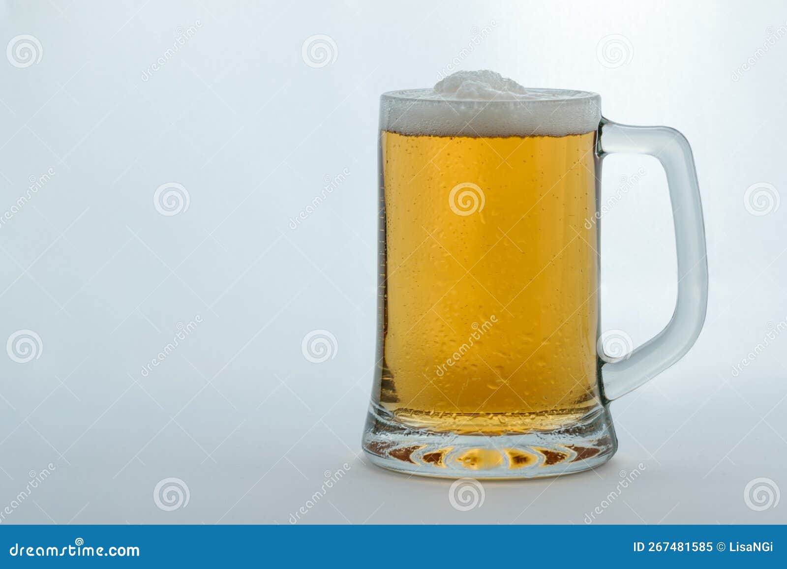 Mug full of beer with foam stock image. Image of golden - 267481585