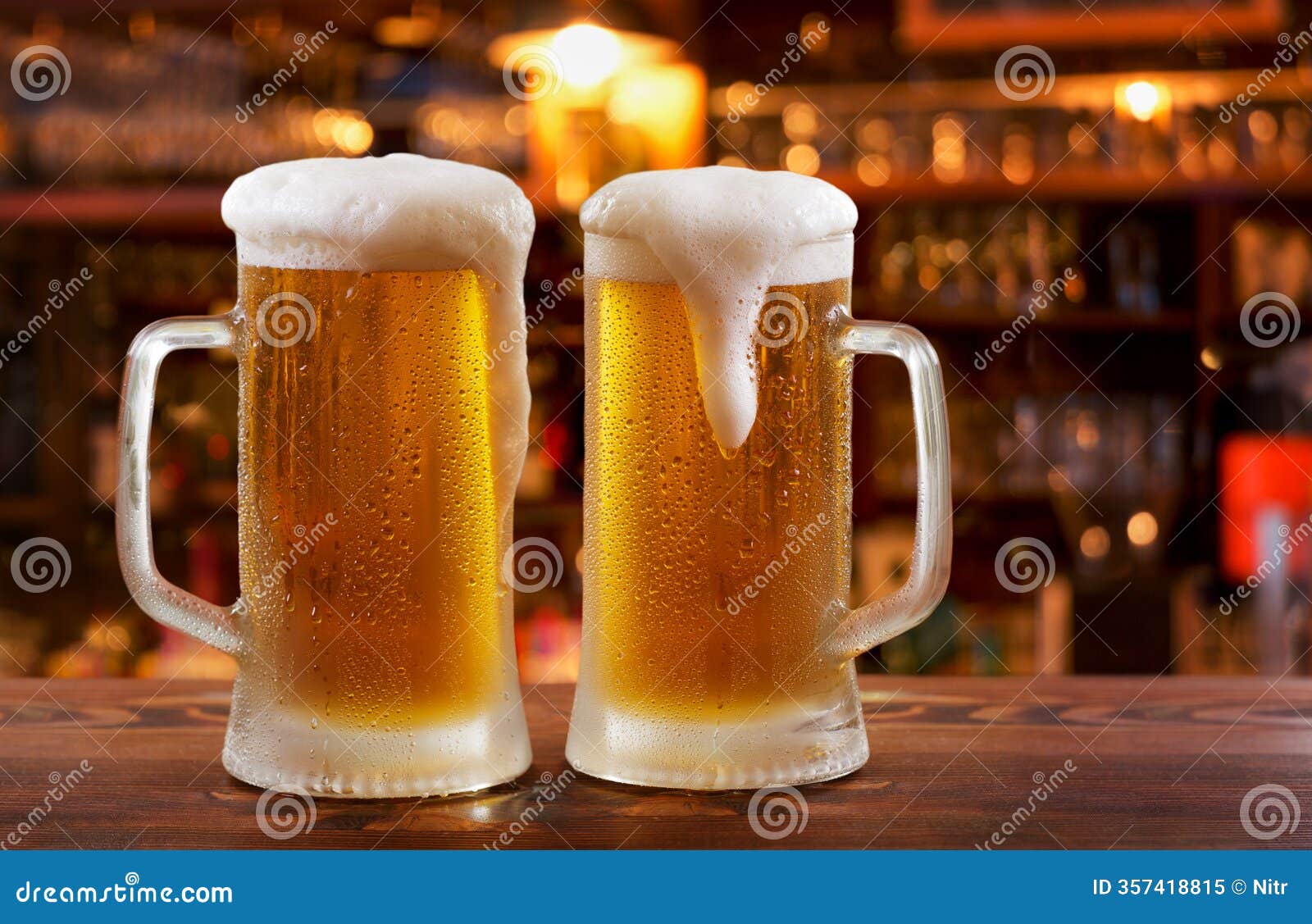 Mugs of Beer in a Bar on Wooden Counter Stock Image - Image of brewery ...