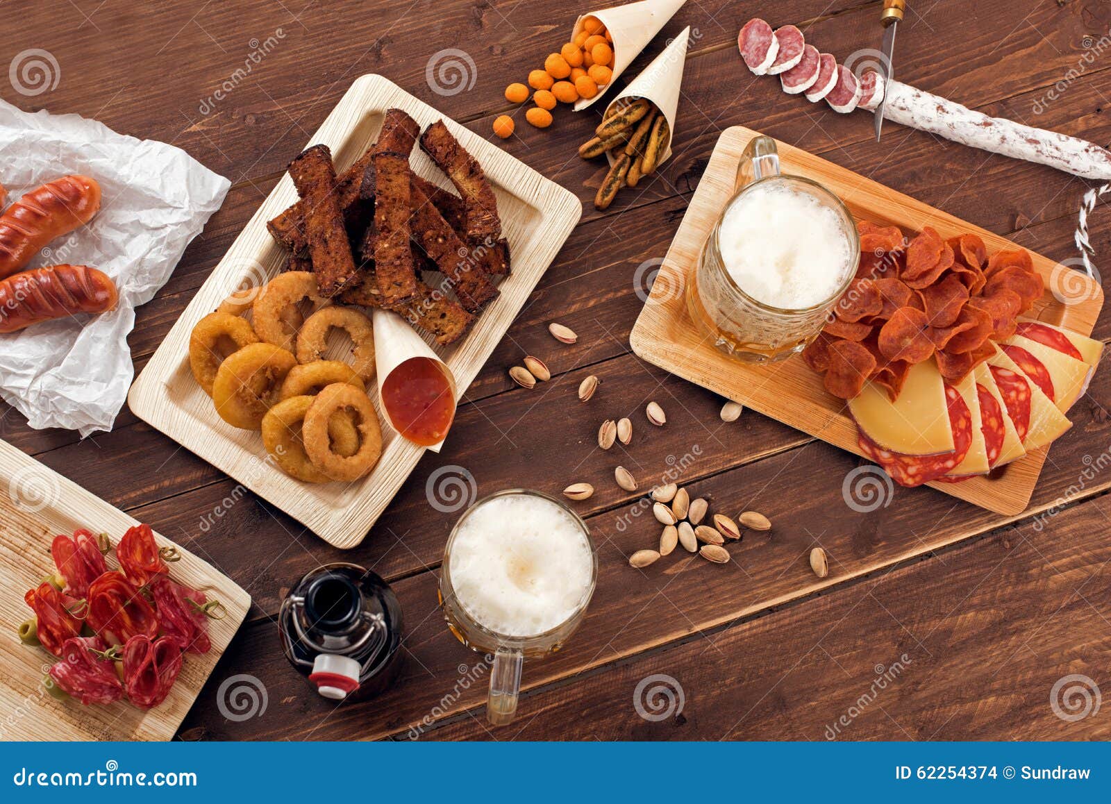 Mugs of beer with snacks stock photo. Image of lager - 62254374