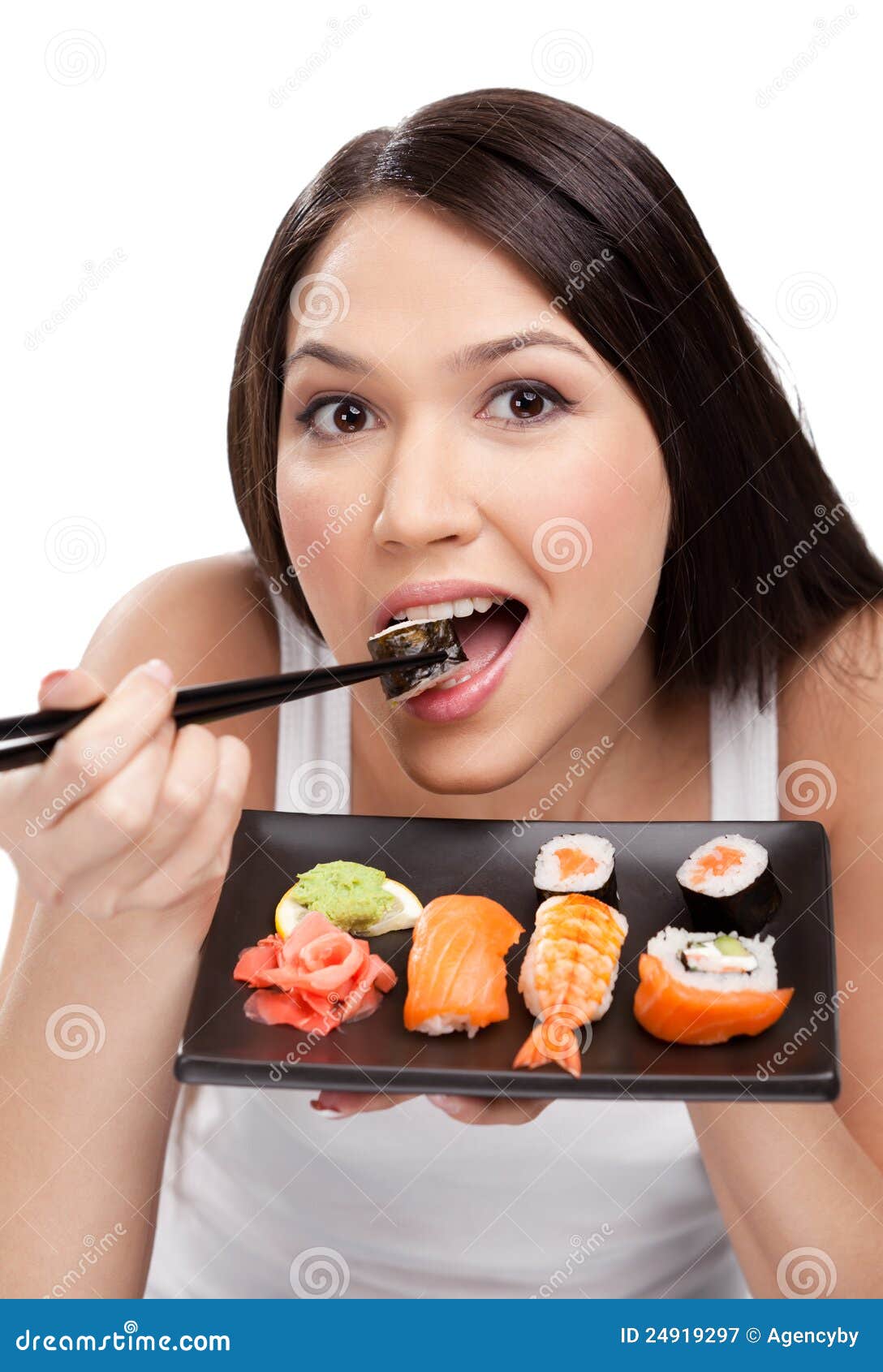 Mujer Joven Que Come El Sushi Imagen de archivo - Imagen de blanco ...