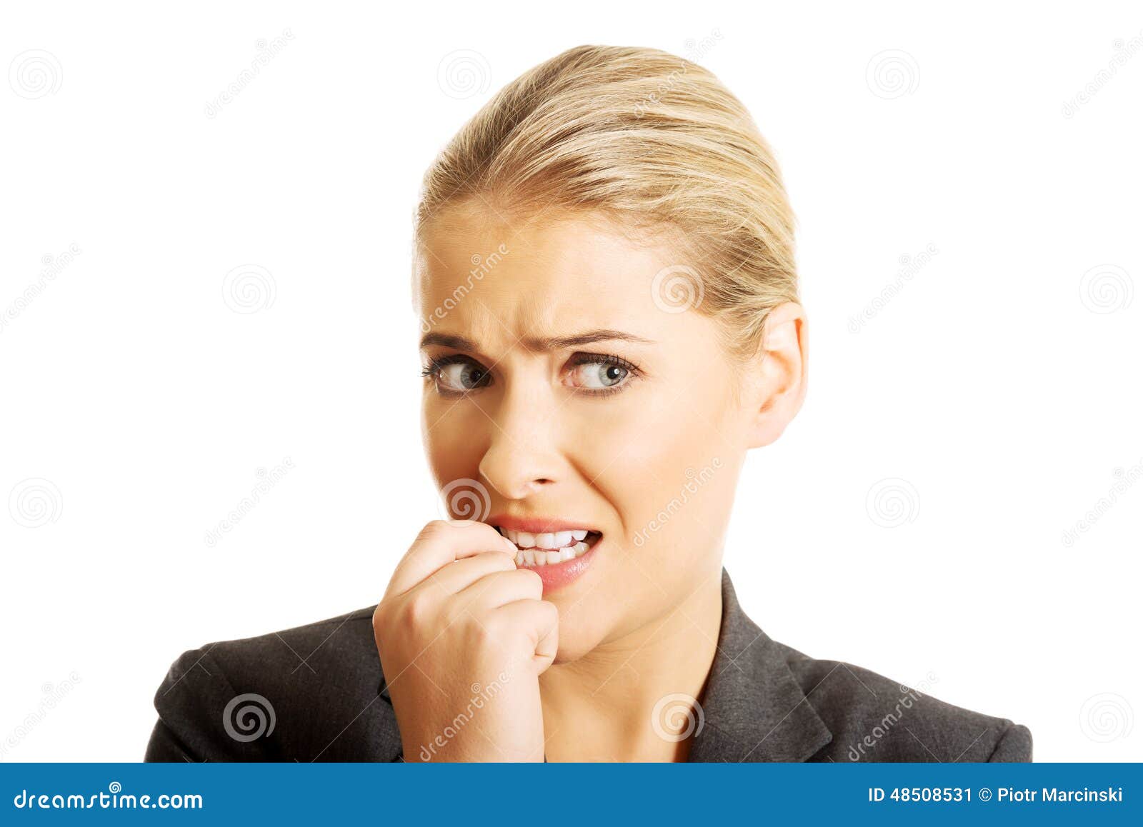 Mujer Joven Subrayada Que Muerde Sus Clavos Imagen de archivo - Imagen ...