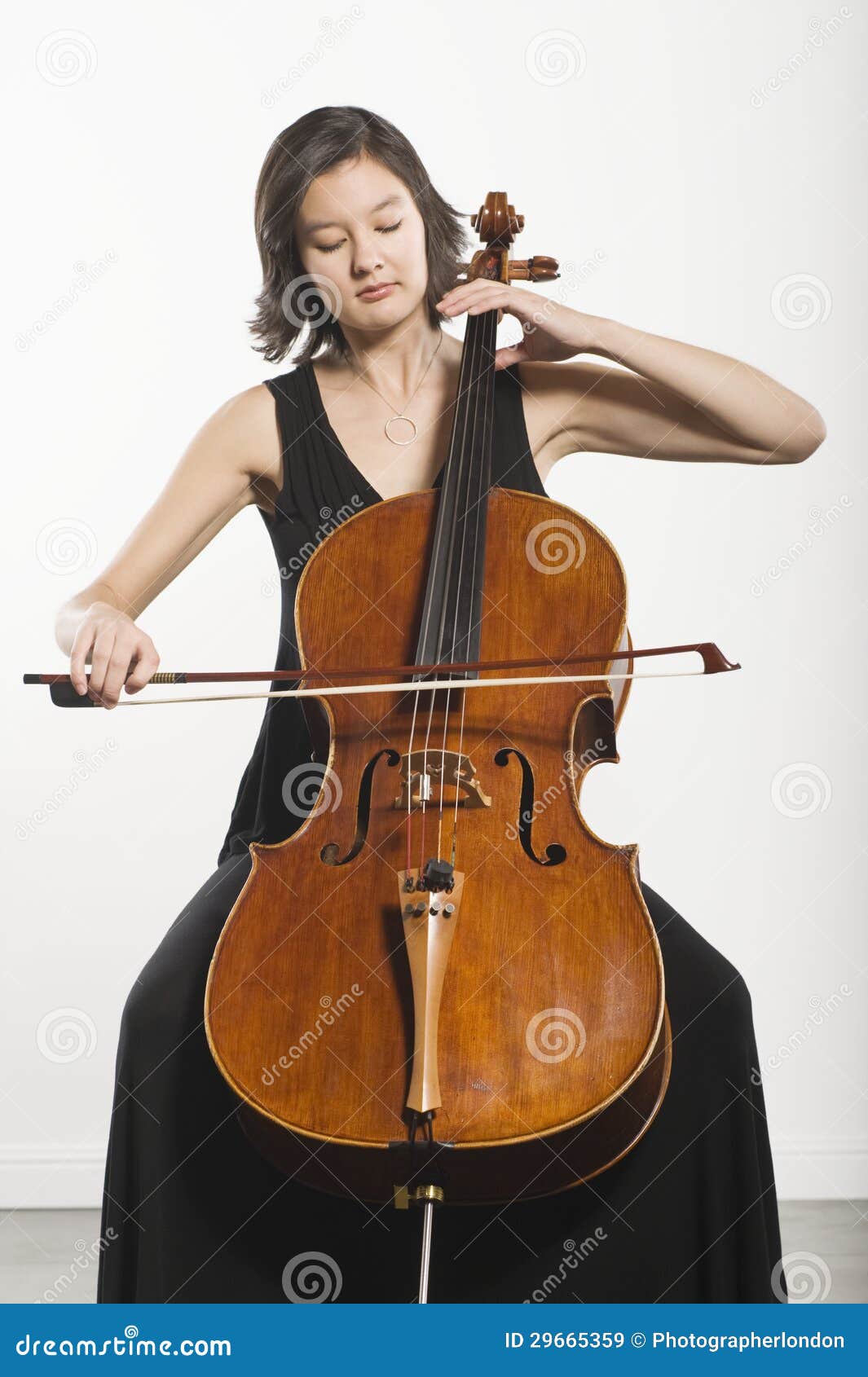 Mujer Que Toca El Violoncelo Imagen de archivo - Imagen de solista ...