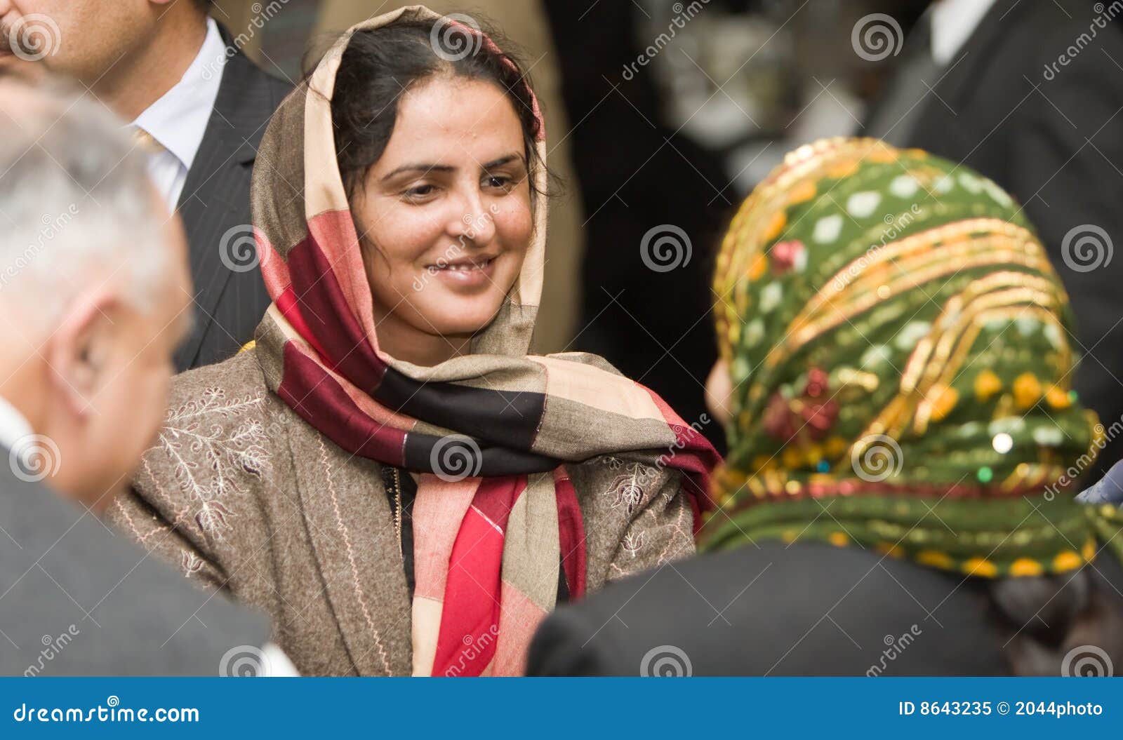 Pakistani Old Woman In Traditional Clothes Gathering Harvest In Garden ...