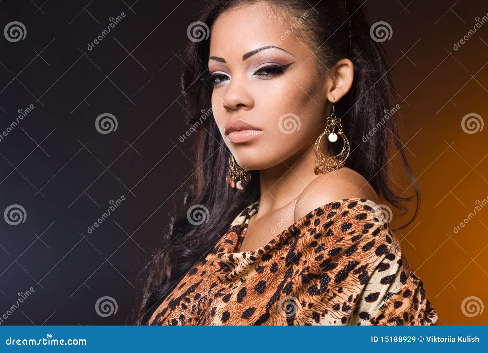 Mulatto woman on orange stock image. Image of lady, elegant - 15188929