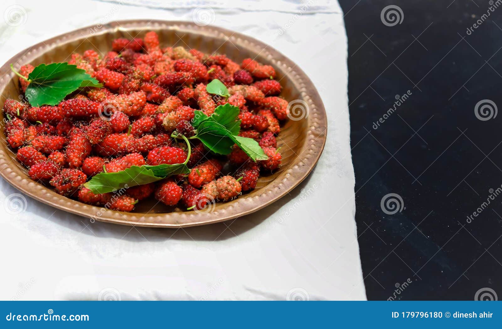 The Mulberry Balls are Put in the Dish with Their Leaves on the Bottom ...