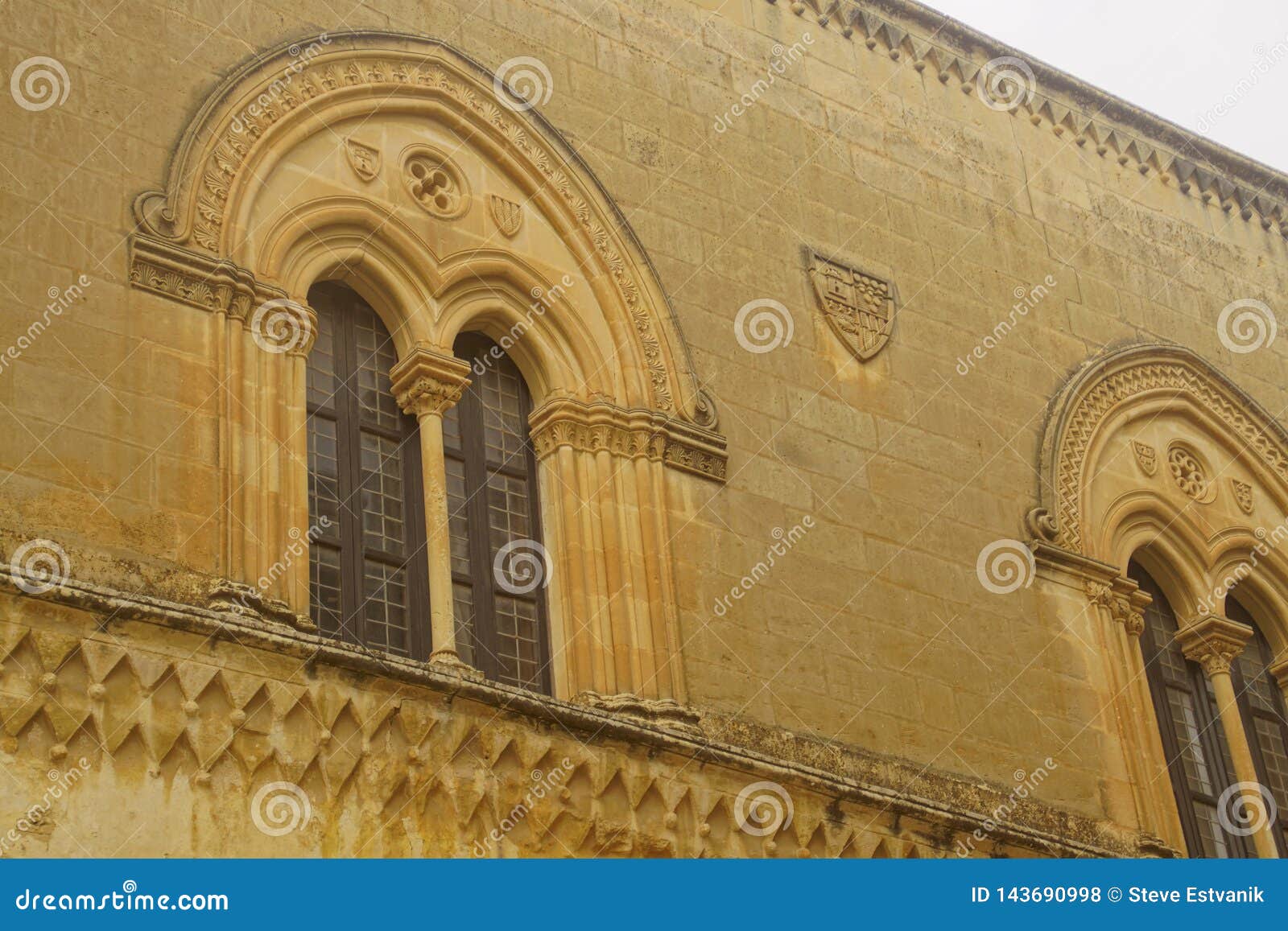Mullioned Windows on Limestone FaCAde Stock Photo - Image of wall ...