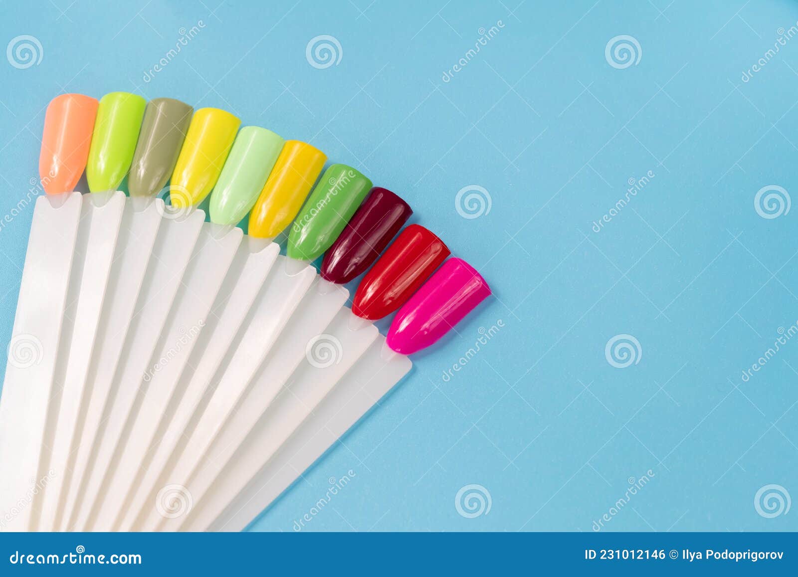 MultiÑ olor Nail Tips on a Blue Background. Examples of Manicure for ...