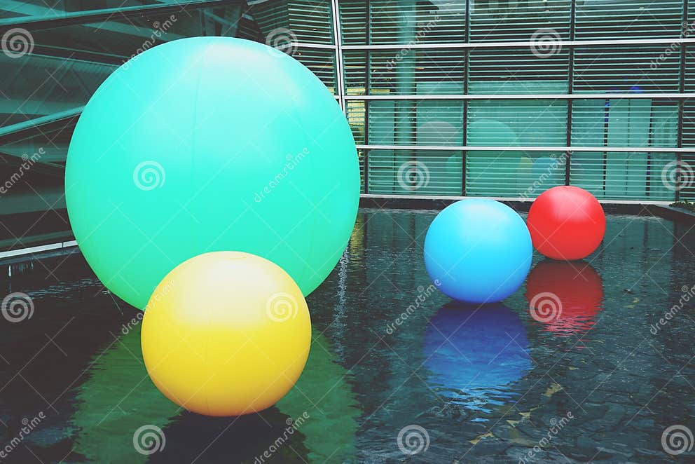 Multi Color Balls on the Water Pool. Background Stock Image - Image of ...