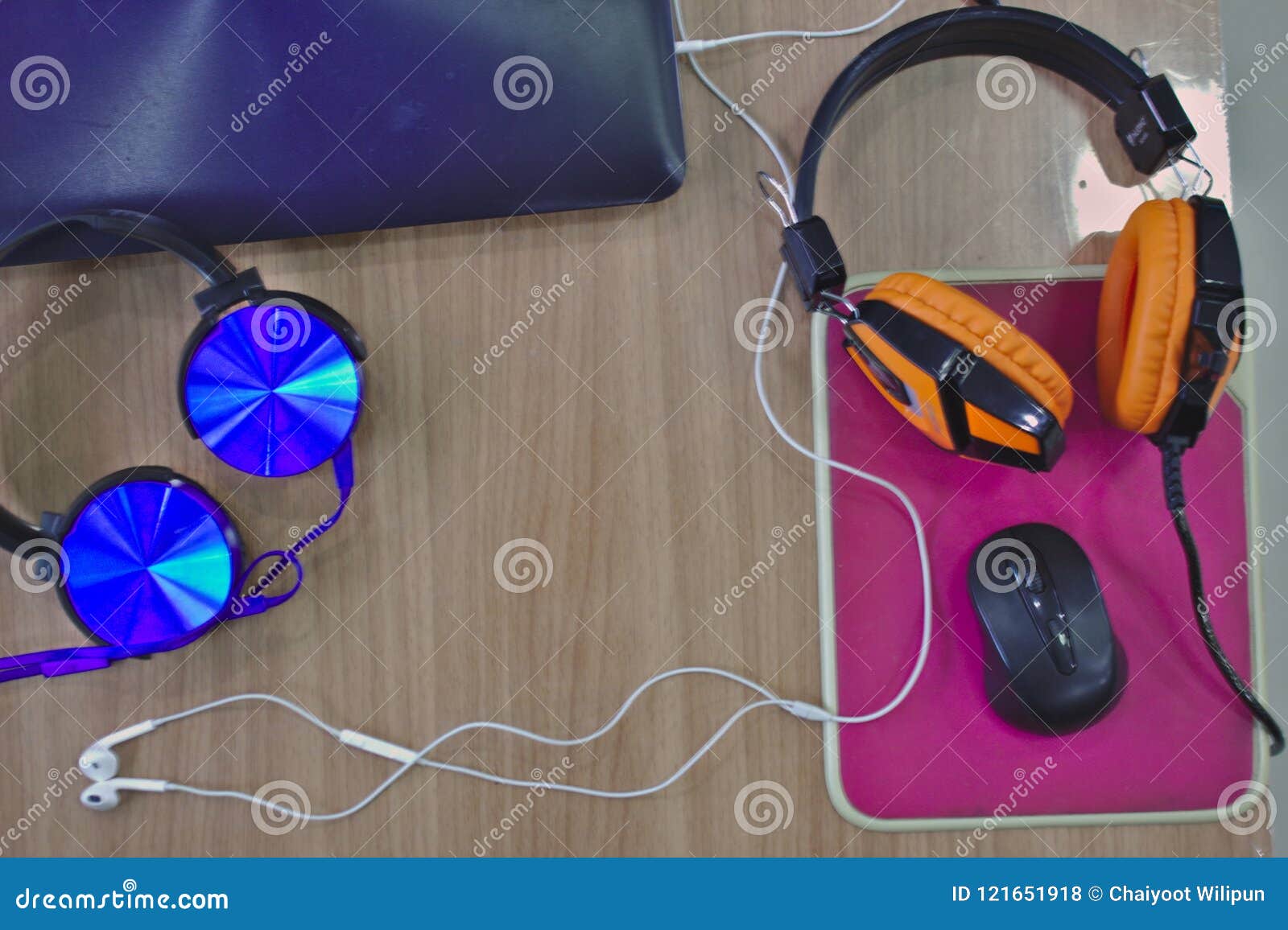 Three Headphones on the Desk. Portable Computers and Controls Stock ...