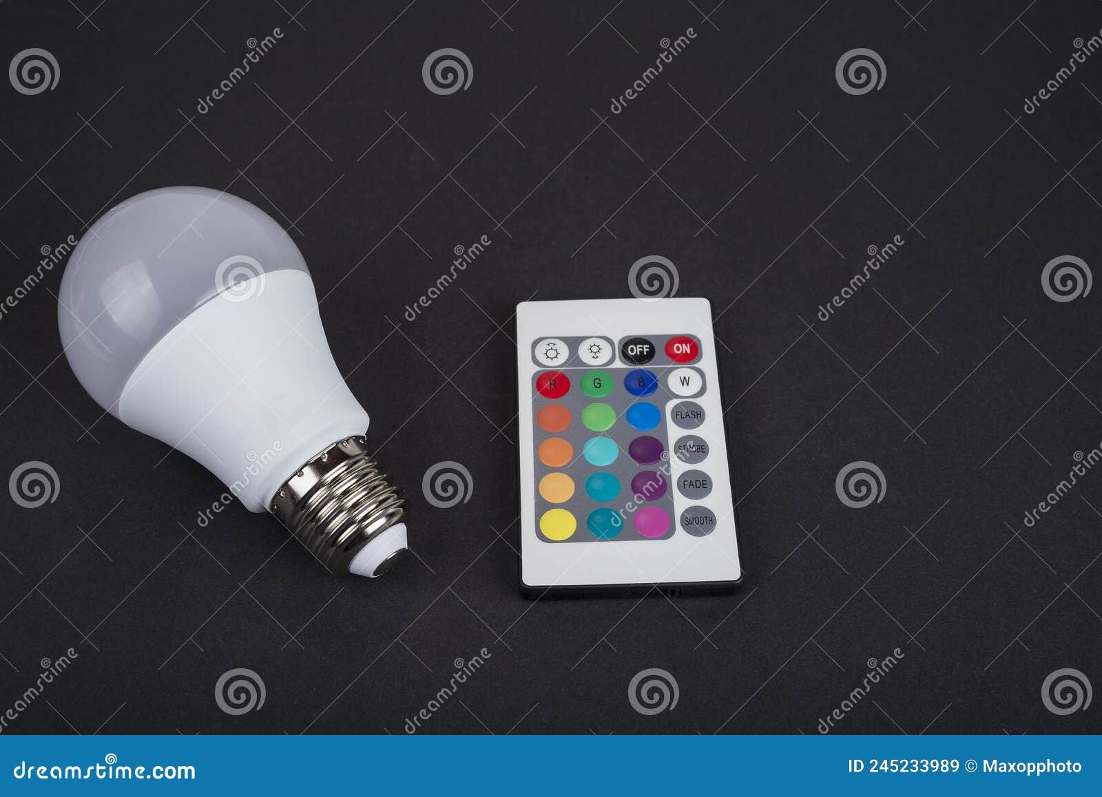 Multi Color Led Bulb with a Remote Control on a Black Background Stock ...