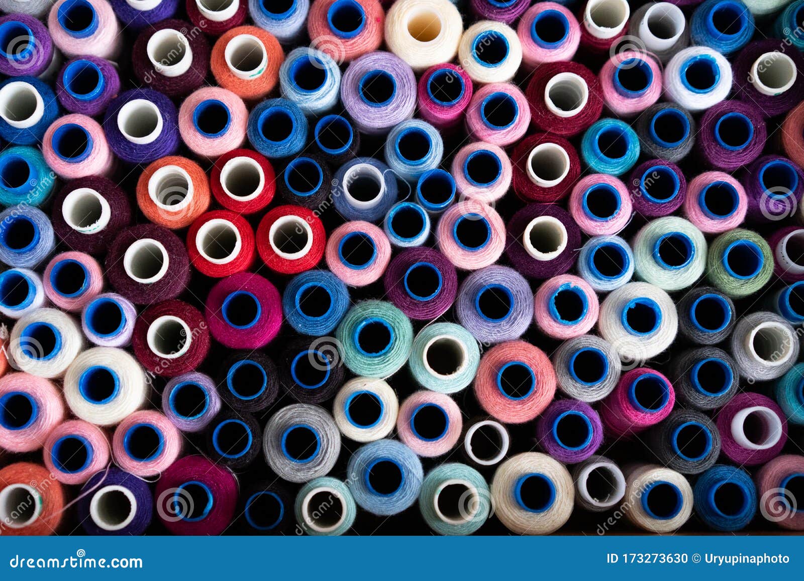 A Lot of Sewing Colored Thread. Thread Reels. Colorful Threads in the ...