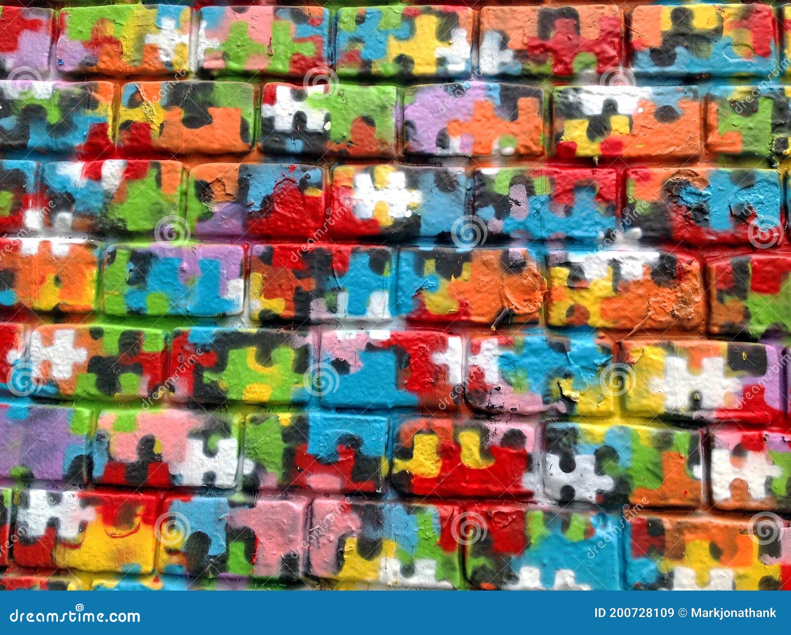 Abstract Painted Brick Wall in Multi-colored Puzzle Piece Shapes Stock ...