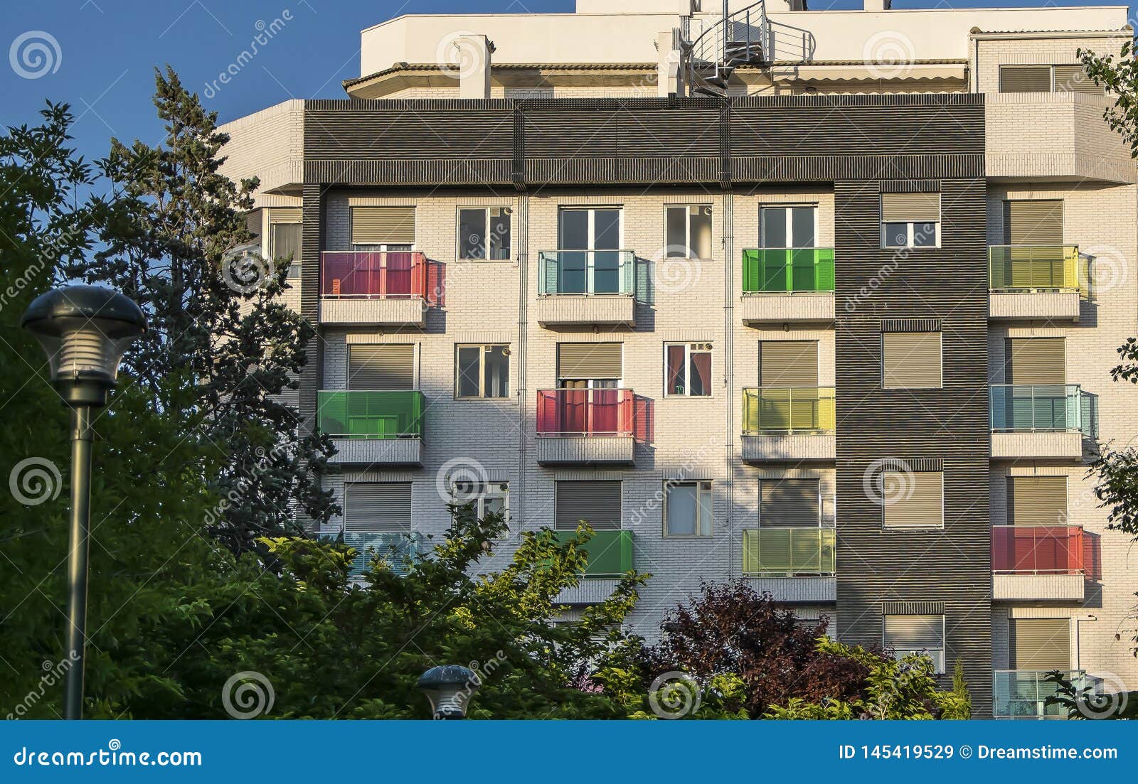 Multi-colored balconies stock image. Image of modern - 145419529