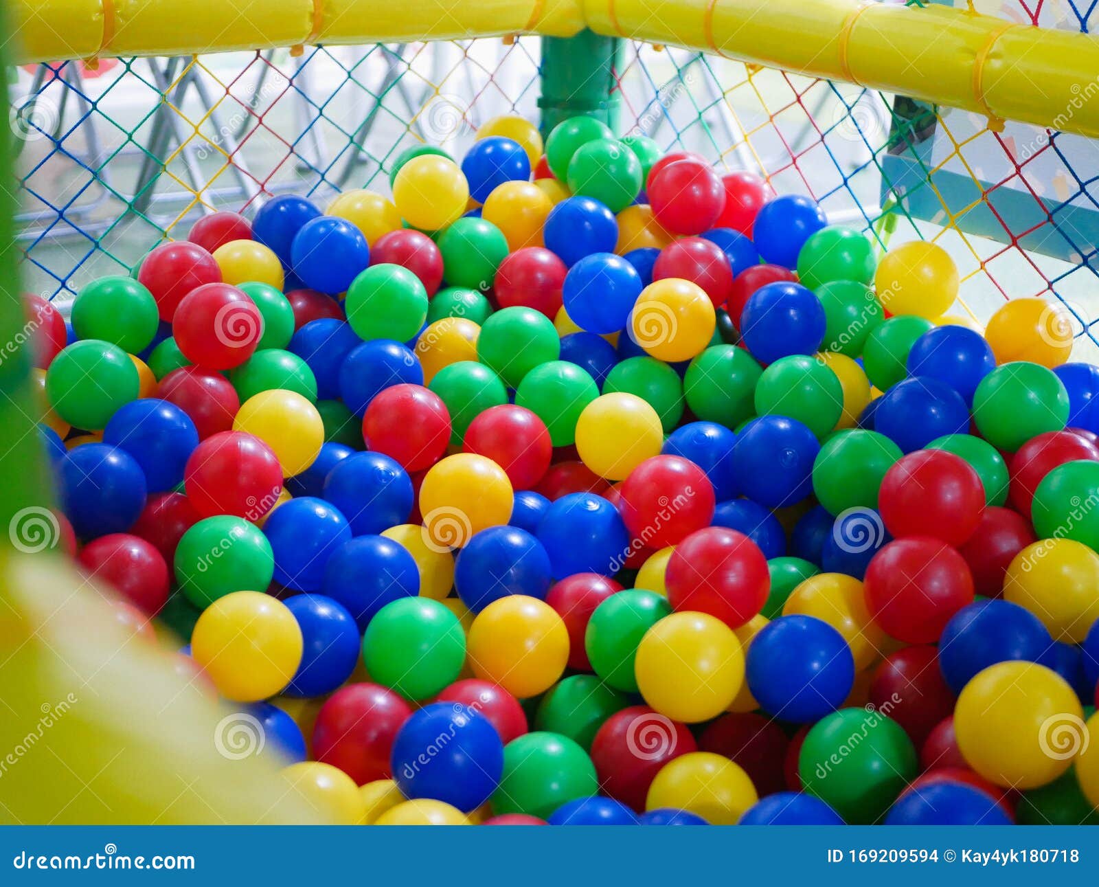 Multi-colored Balls in the Nursery. Multi-colored Plastic Balls in the ...