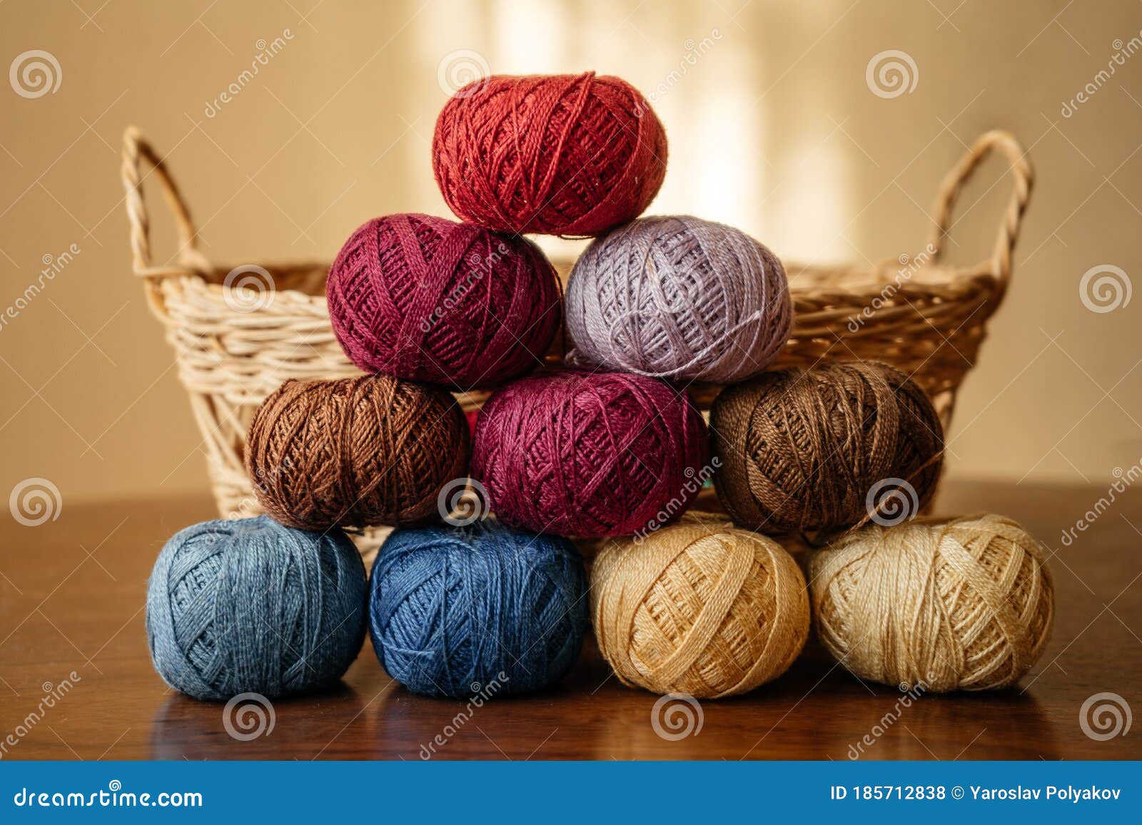 Multi-colored Balls of Wool Yarn Folded into a Pyramid Stock Photo ...