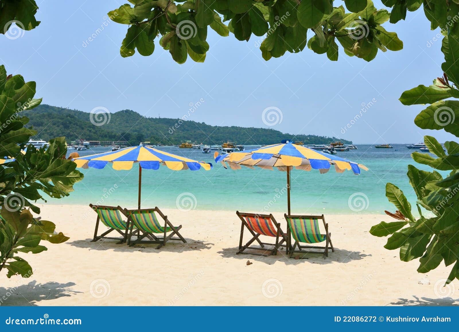 Multi-colored Beach Umbrellas and Chaise Lounges Stock Photo - Image of ...
