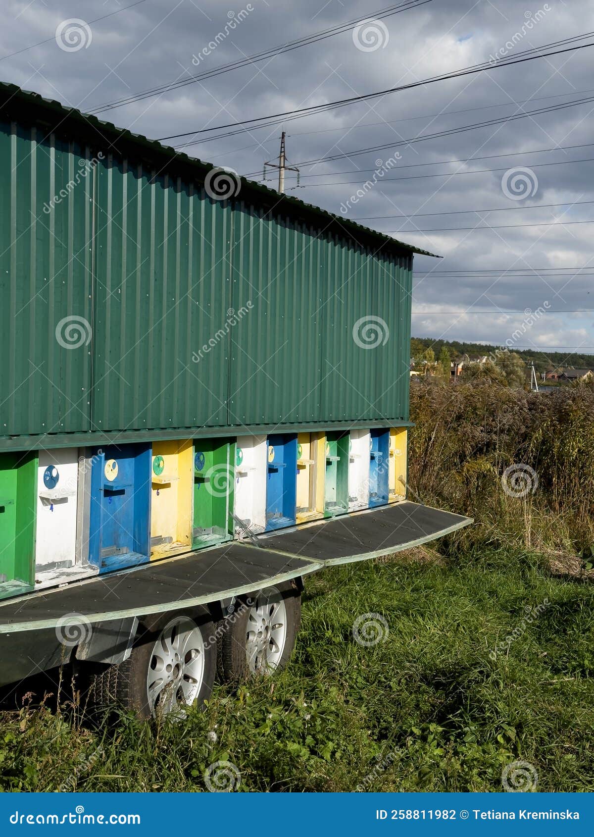 Multi-colored Bee Hives on a Trailer. Mobile Apiary. Stock Photo ...