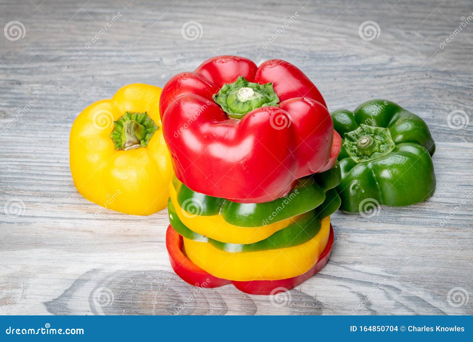Multi Colored Bell Peppers Uniquely Stacked on a Tabletop Stock Photo ...