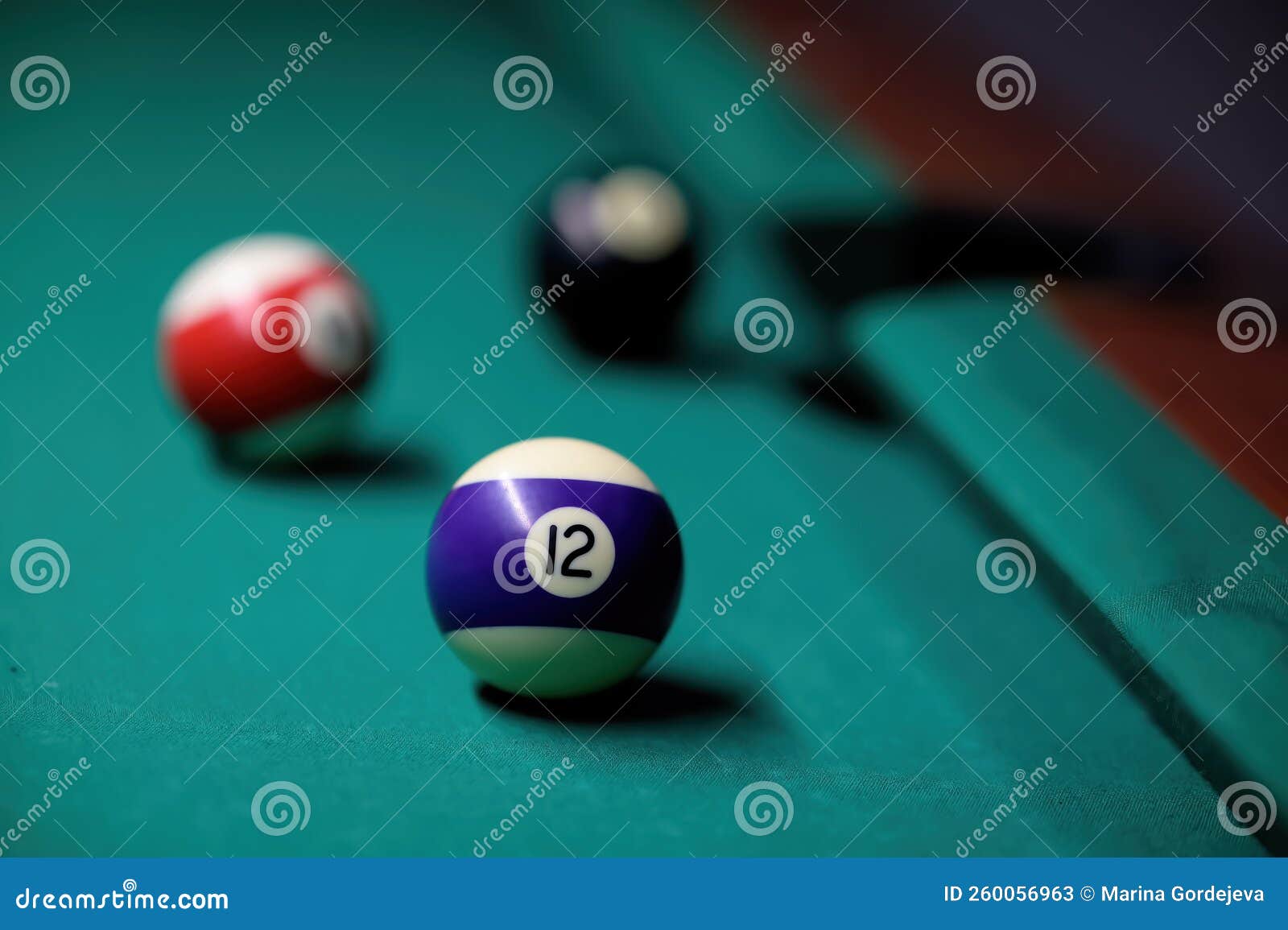 Multi-colored Billiard Balls on a Green Table Surface. Close-up Stock ...