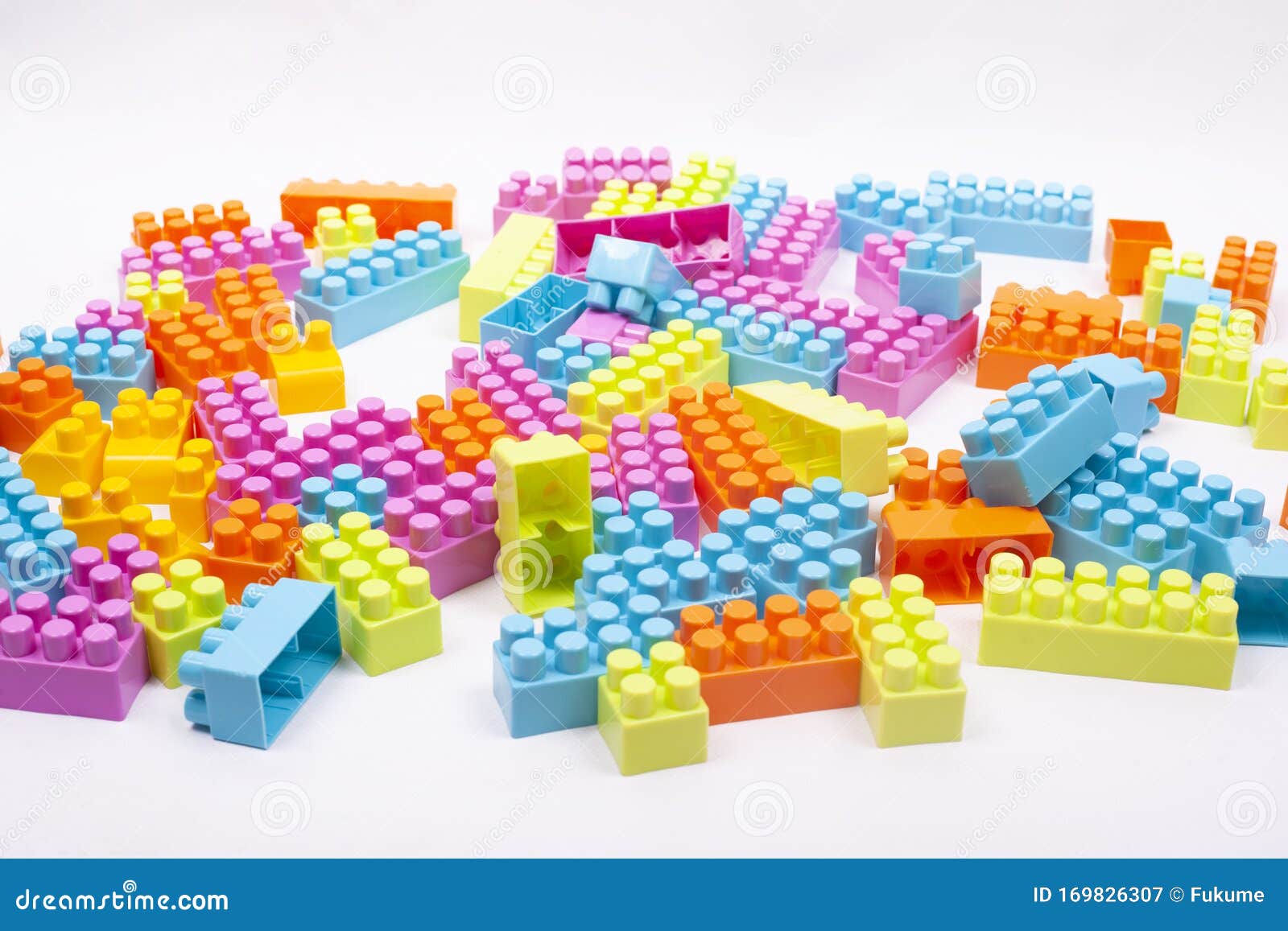 Multi Colored Blocks of a Children Designer Scattered on a White ...