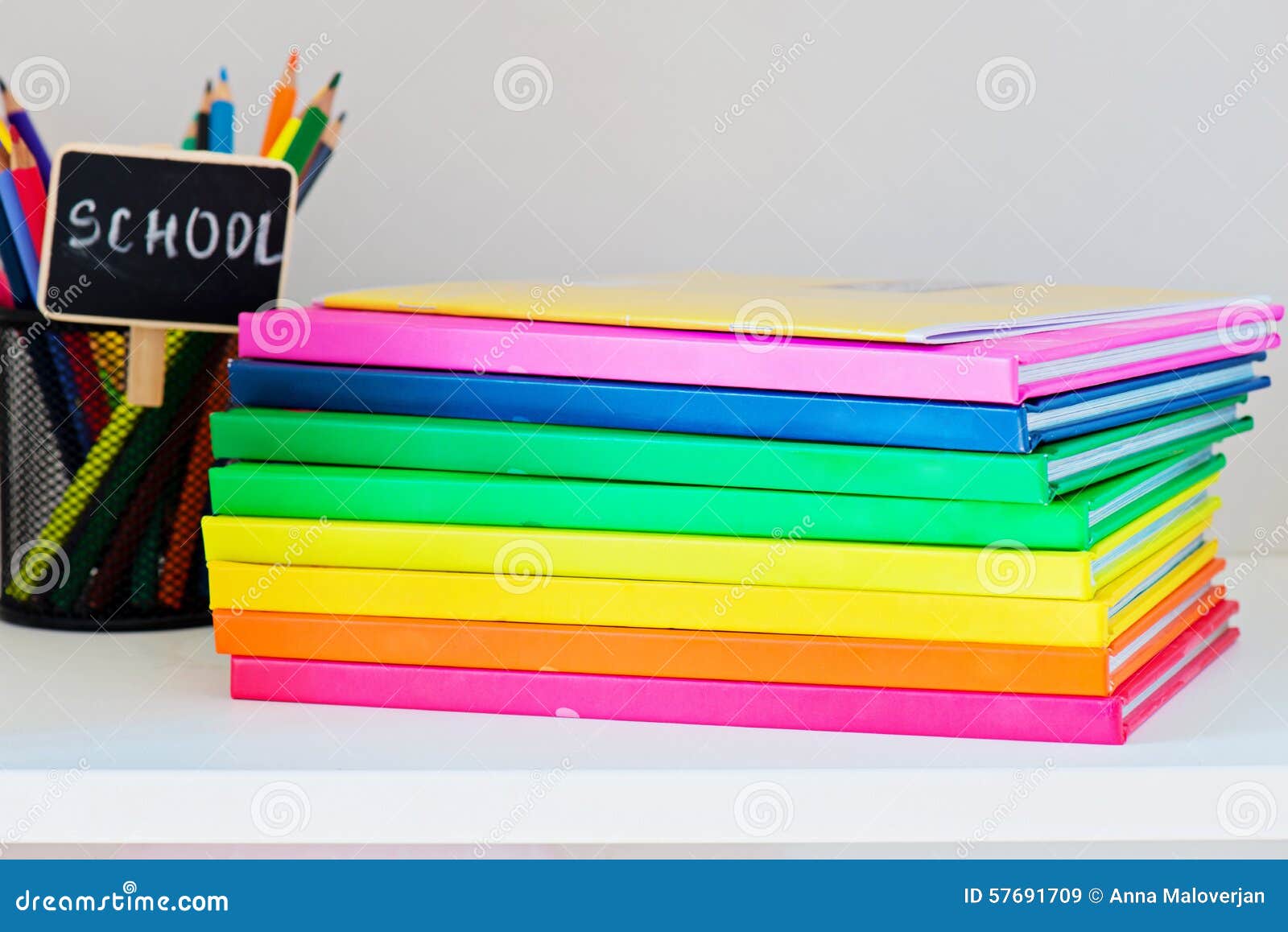 Multi Colored Books in Stack on the Light-coloured Bookshelf Stock ...