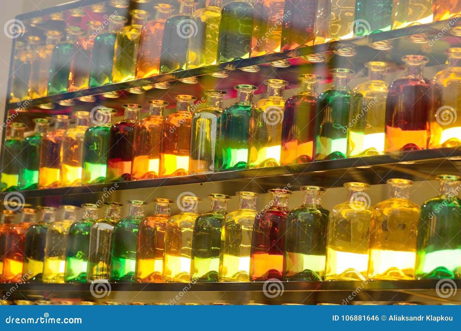 Multi-colored Bottles in the Window. Stock Photo - Image of liquid ...