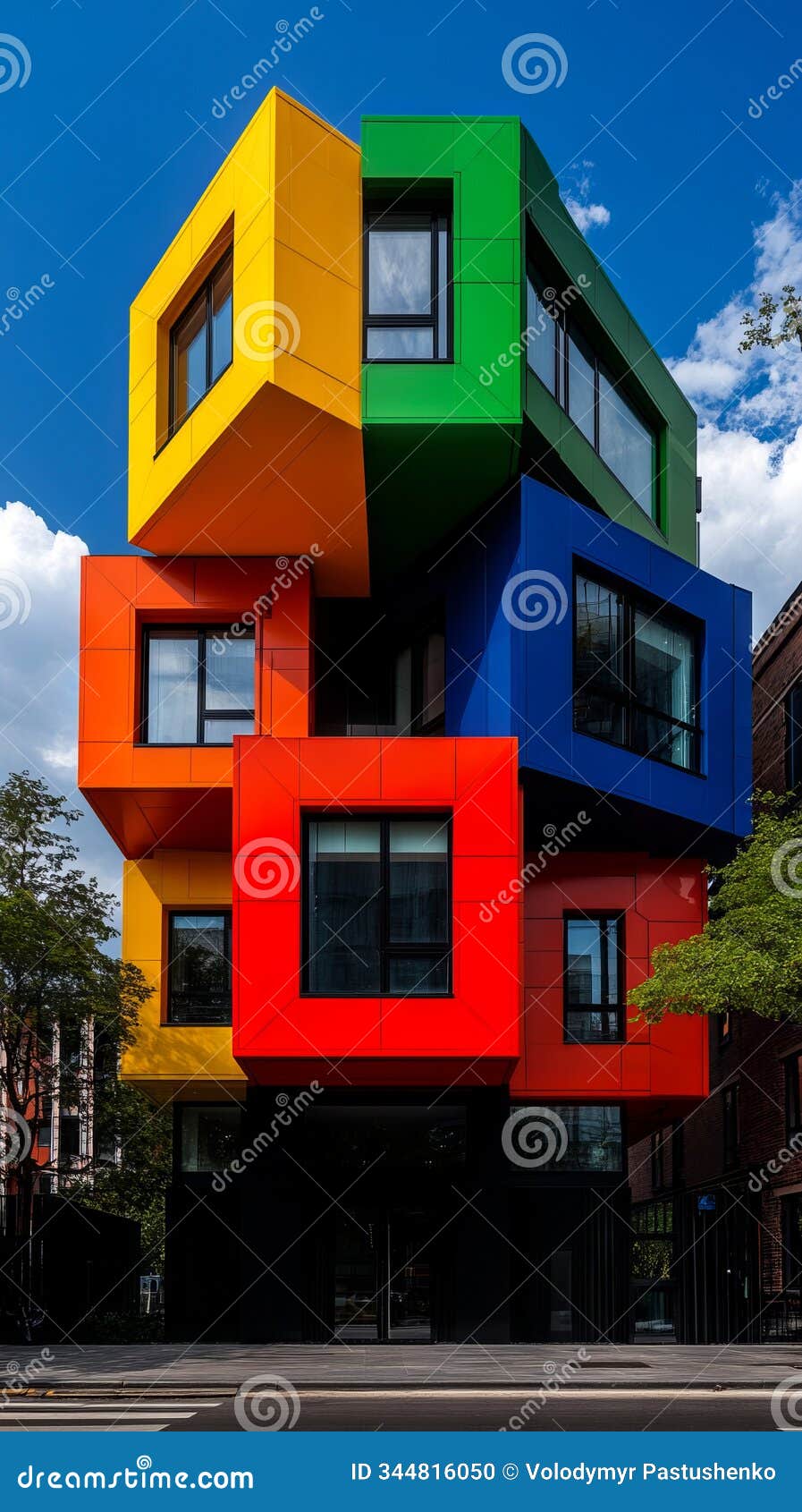 A Multi-colored Building on the Corner of a City Street Stock Photo ...