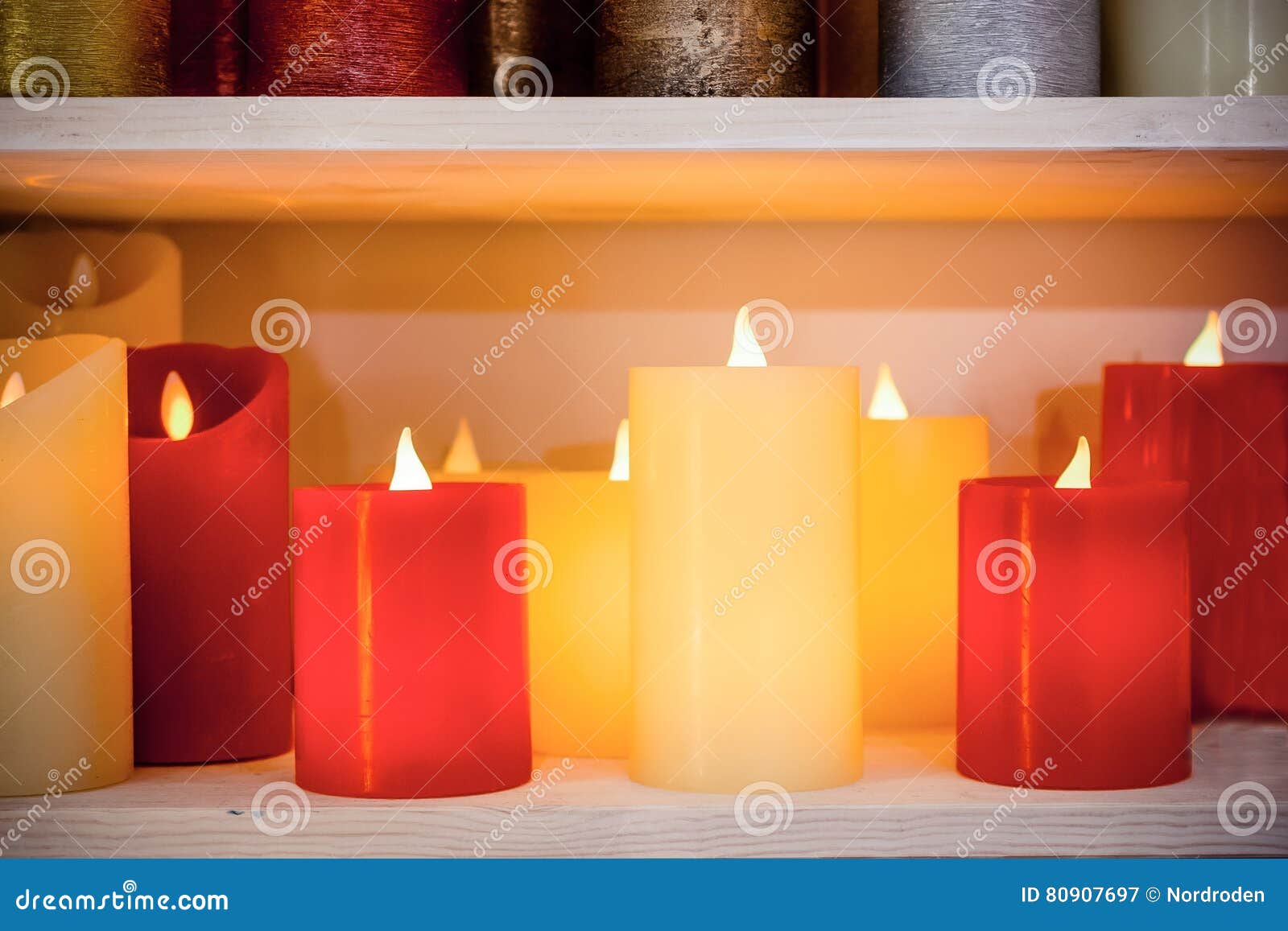 Multi-colored Candles are Arranged in a Single Row. Stock Image - Image ...