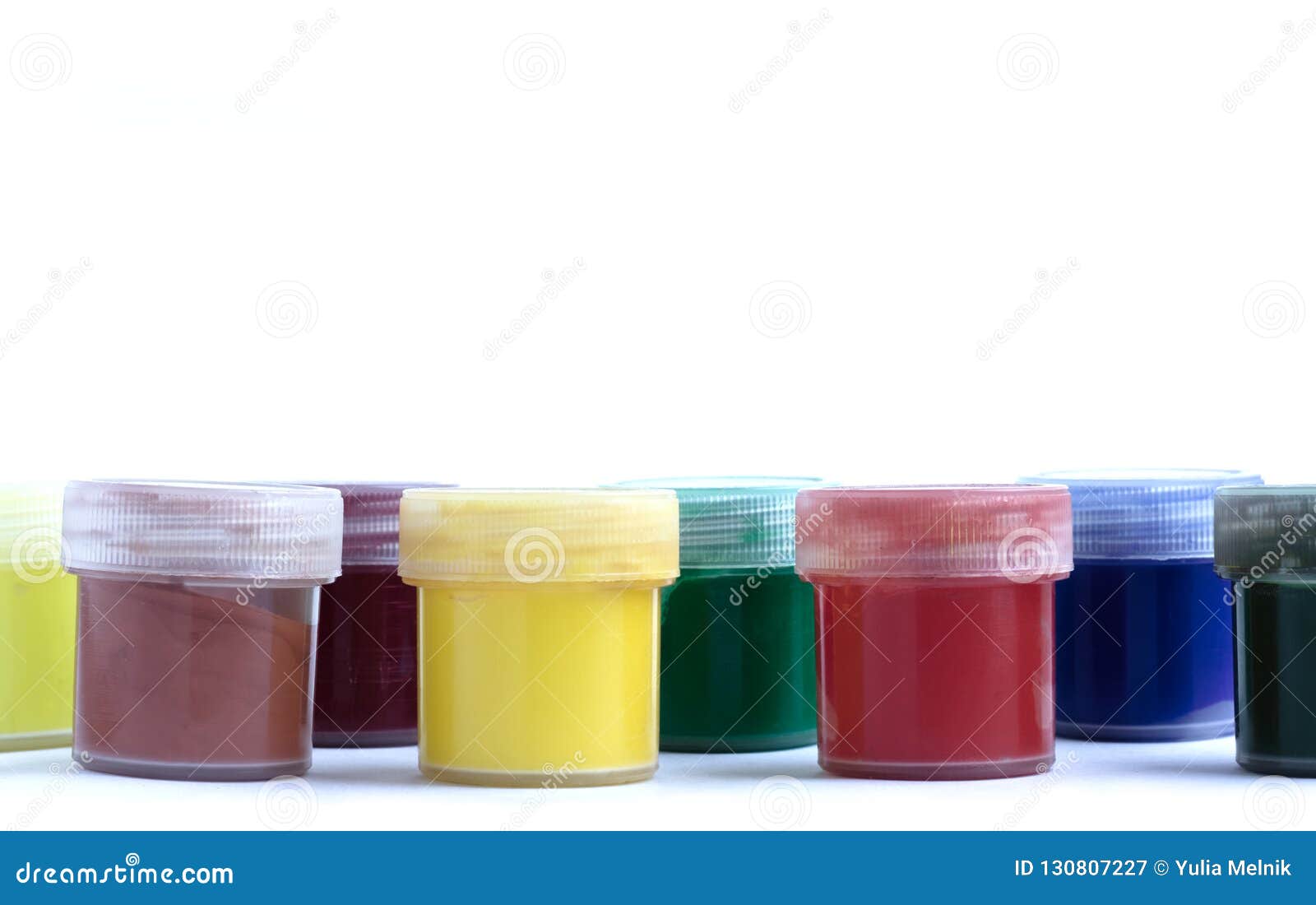 Multi-colored Cans of Gouache in a Row on a White Background Stock ...