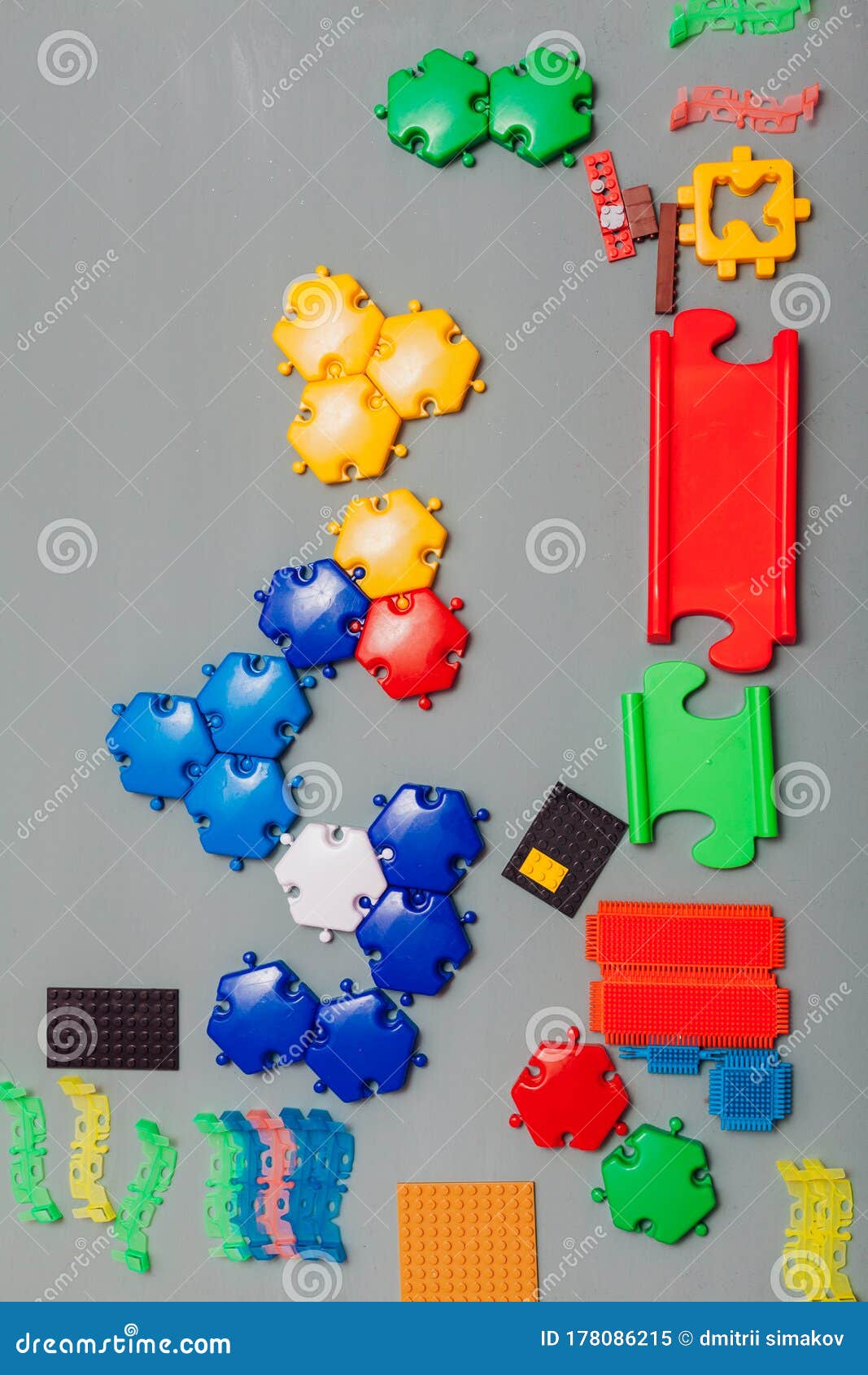 Multi-colored Children`s Developing Game Designer on a Gray Background ...