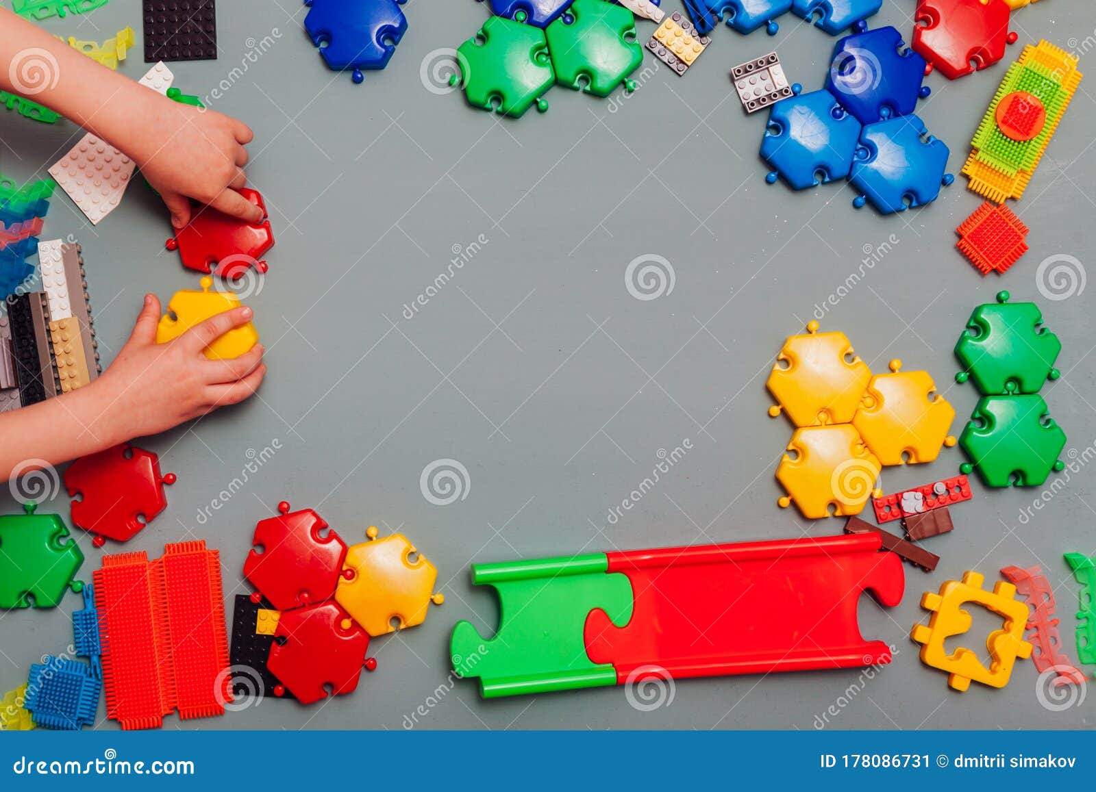 Multi-colored Children`s Developing Game Designer on a Gray Background ... Multi-colored Children`s Developing Game Designer on a Gray Background ...