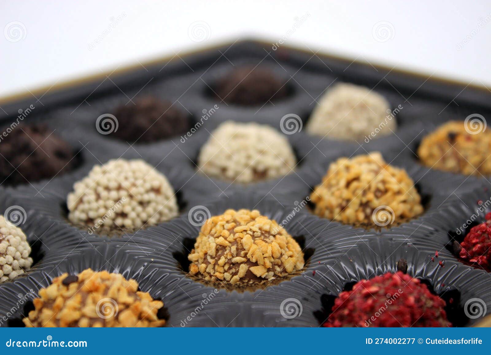 Multi-colored Chocolates in Dark Packaging Stock Image - Image of path ...
