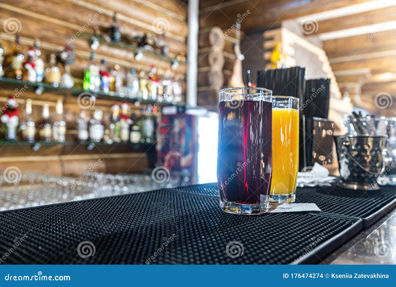 Multi-colored Cocktails and Soft Drinks on a Bar Counter in Glass ...