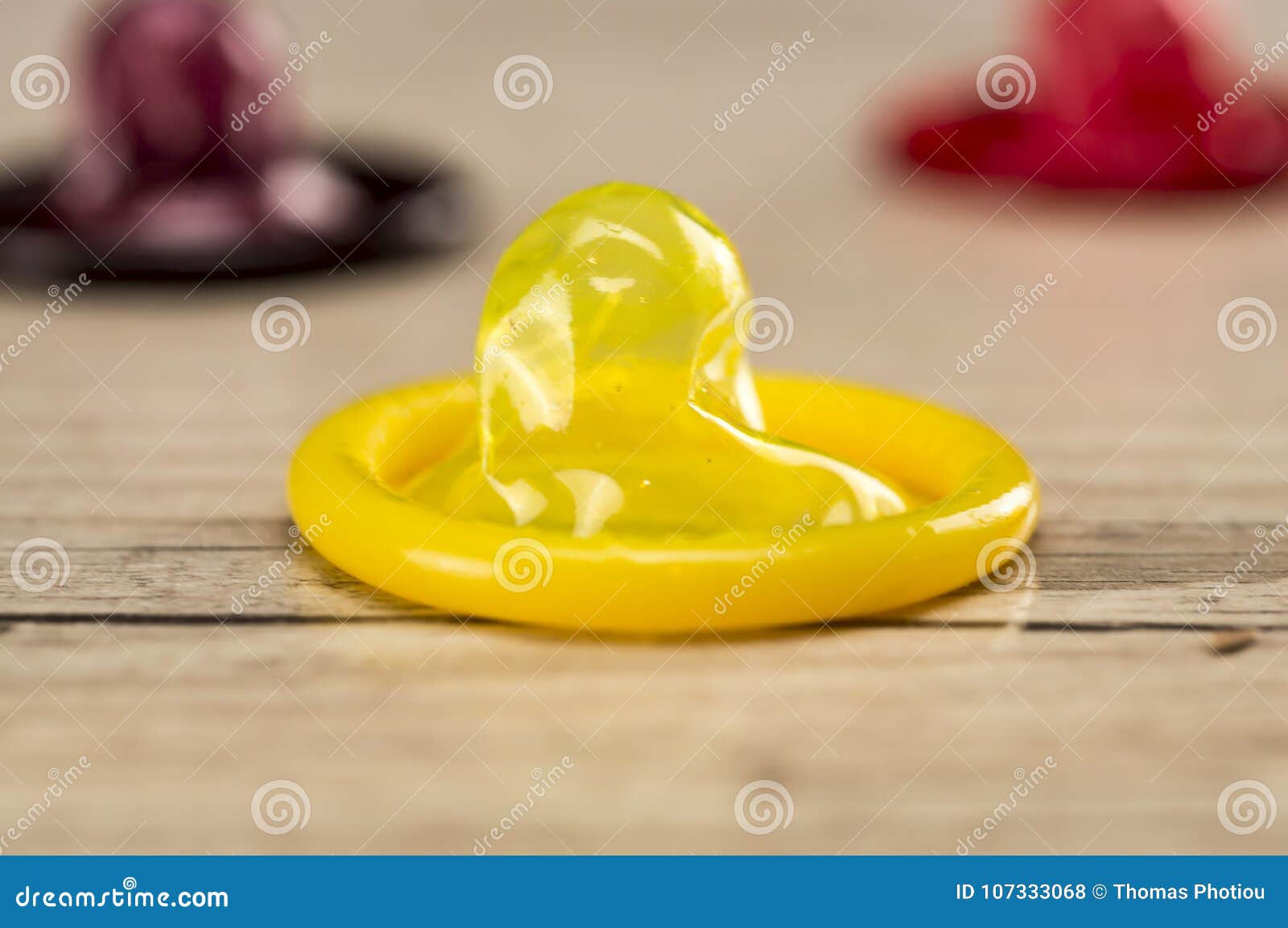 Multi colored condoms stock photo. Image of color, health - 107333068
