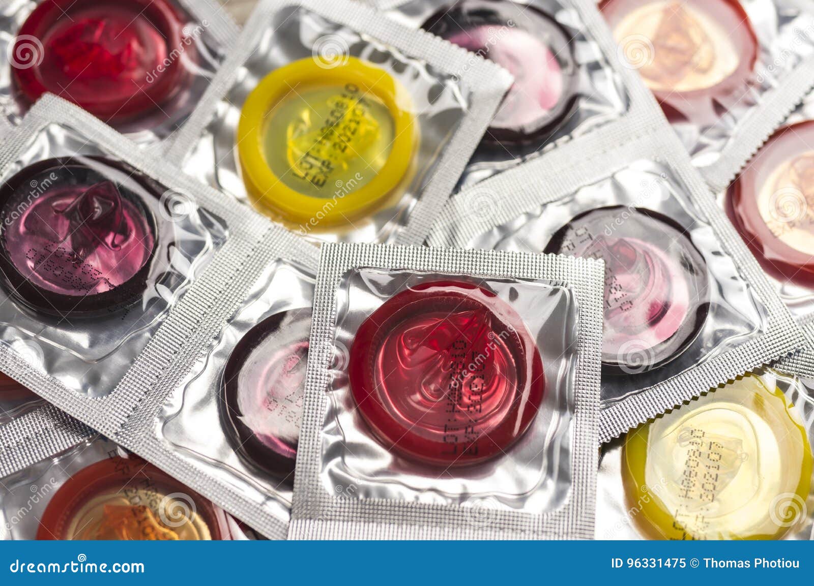 Multi colored condoms stock image. Image of healthy, lifestyle - 96331475