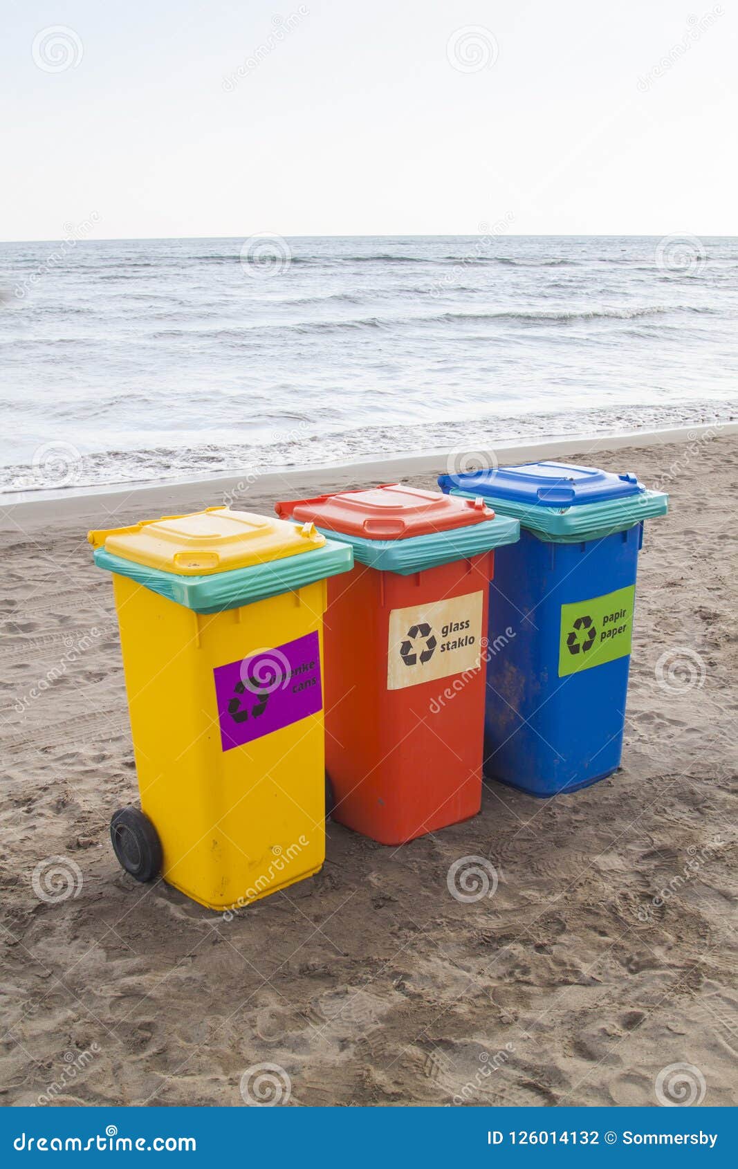 Multi-colored Containers for Sorting Garbage are on the Beach Ag Stock ...