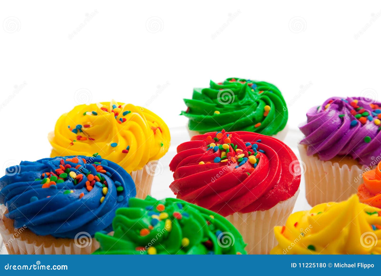 Multi colored cupcakes stock photo. Image of confection - 11225180