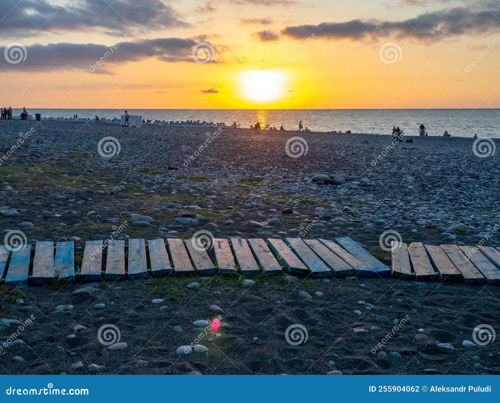 Multi-colored Decking on a Pebble Beach. the Path To the Shore from ...